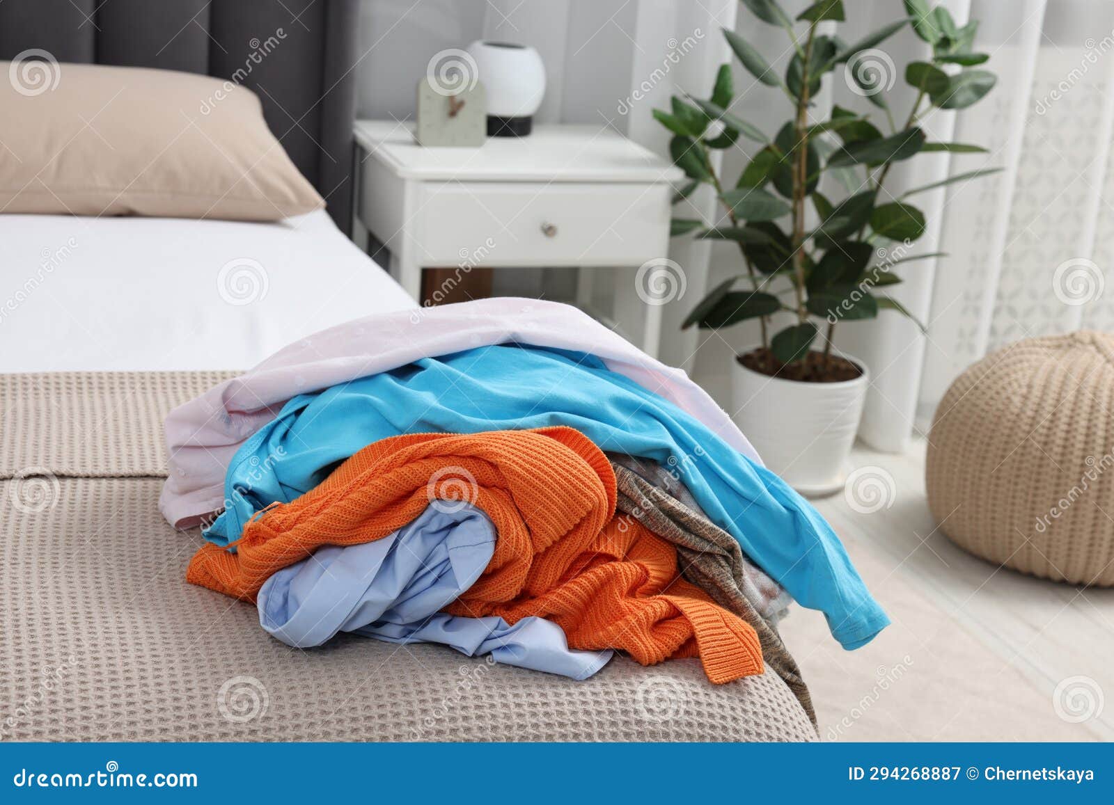 Pile of Different Clothes on Bed at Home Stock Image - Image of ...