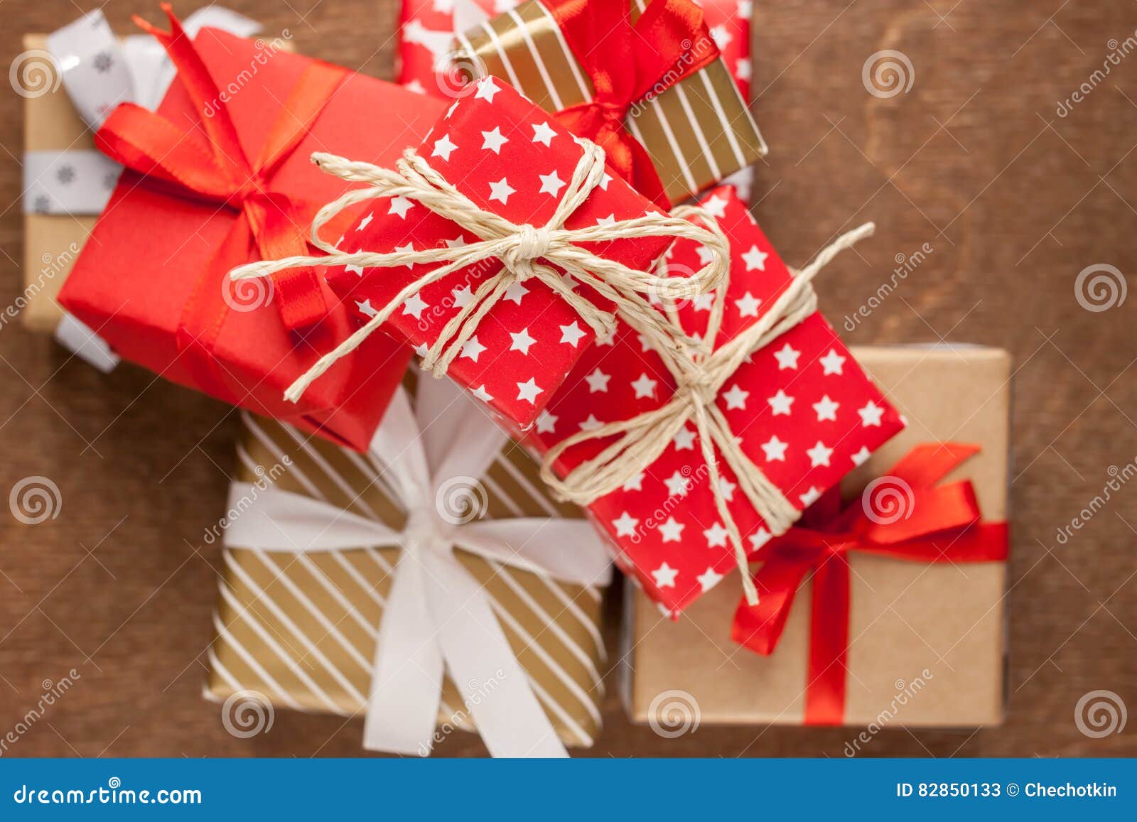 Pile of Different Gifts on Wooden Background Stock Image - Image of ...