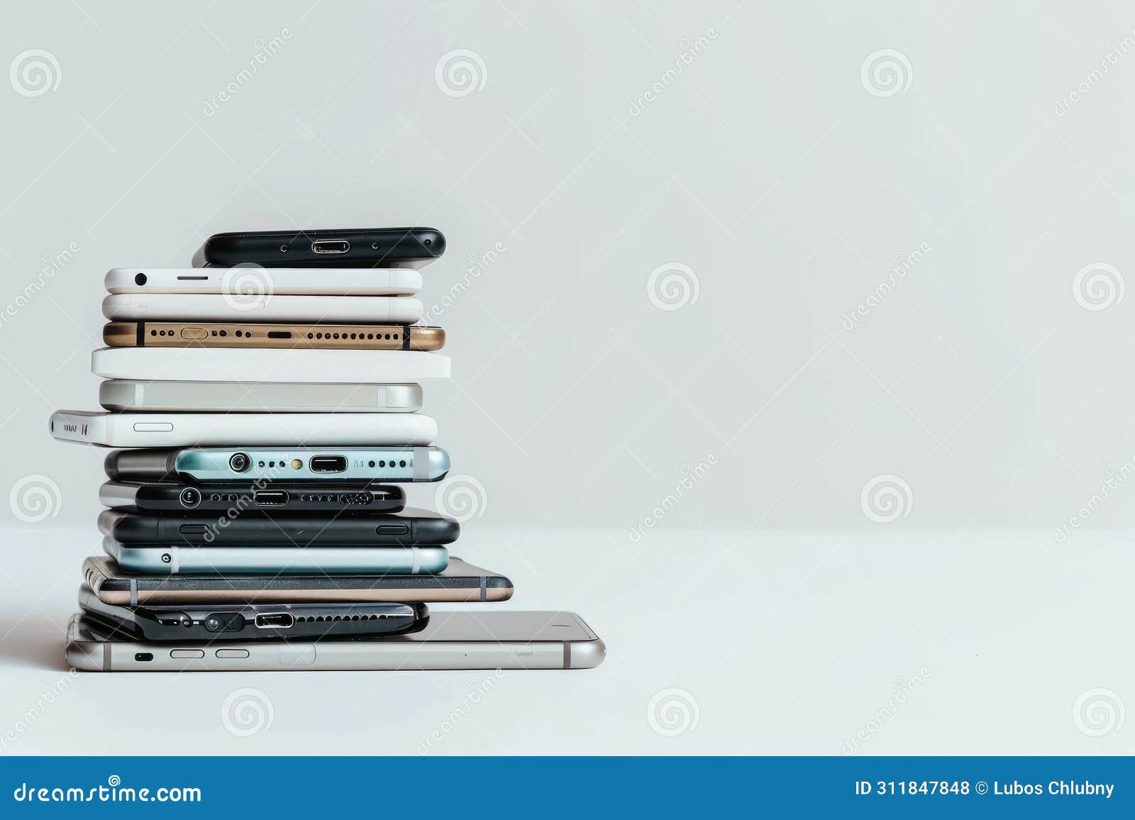 A Pile of Different Smartphones Isolated on a White Background Stock ...
