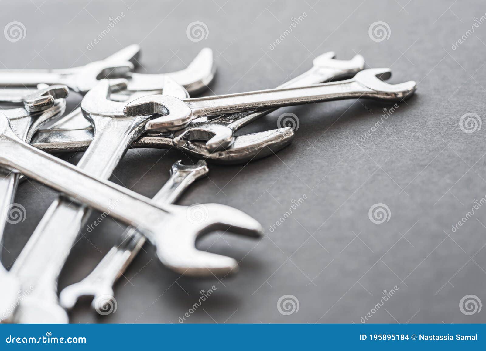 Pile of Different Wrenches on a Gray Matte Surface Stock Photo - Image ...