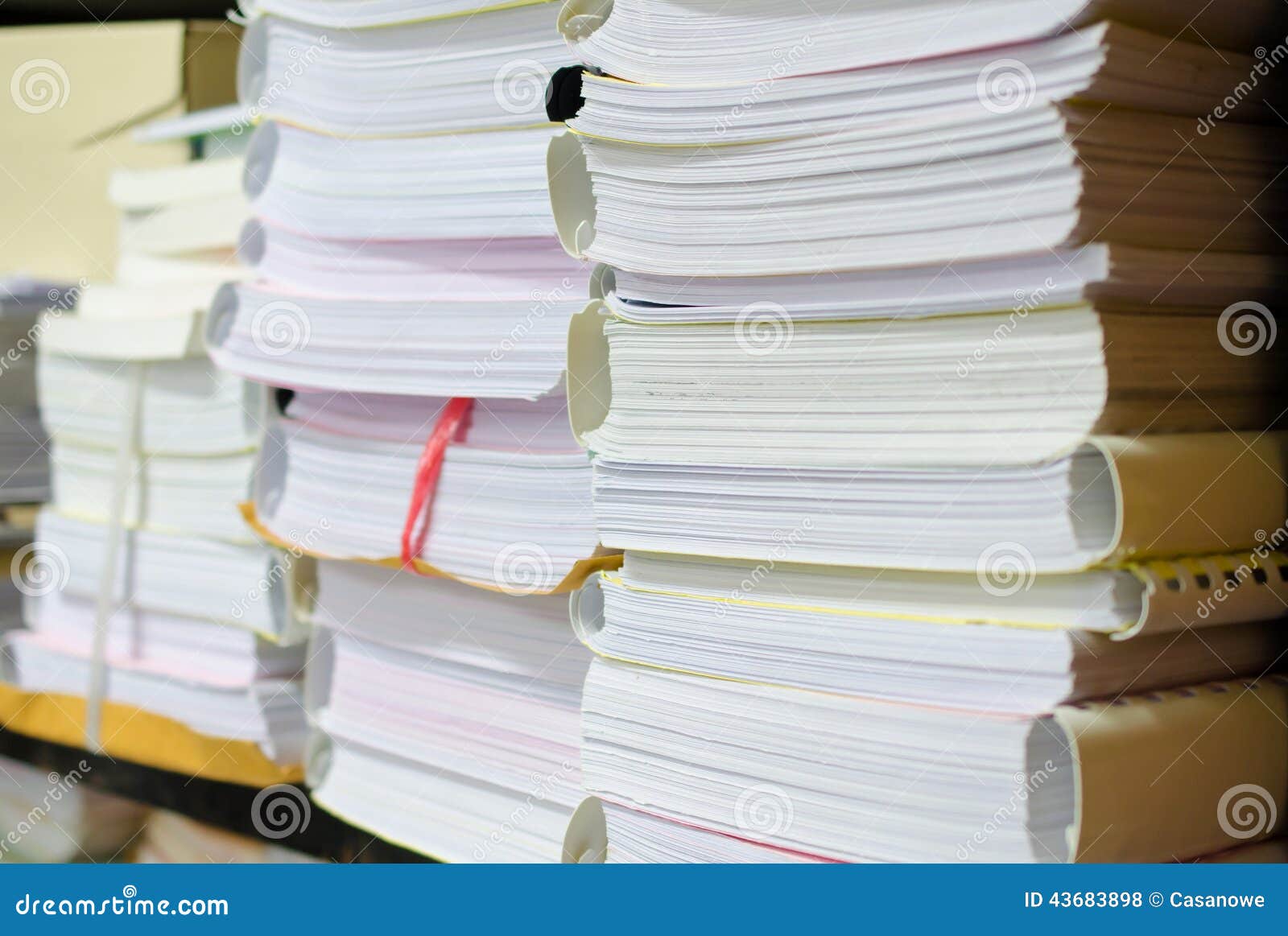 Pile of Documents on Desk Stack Up High Waiting To Be Managed. Stock ...
