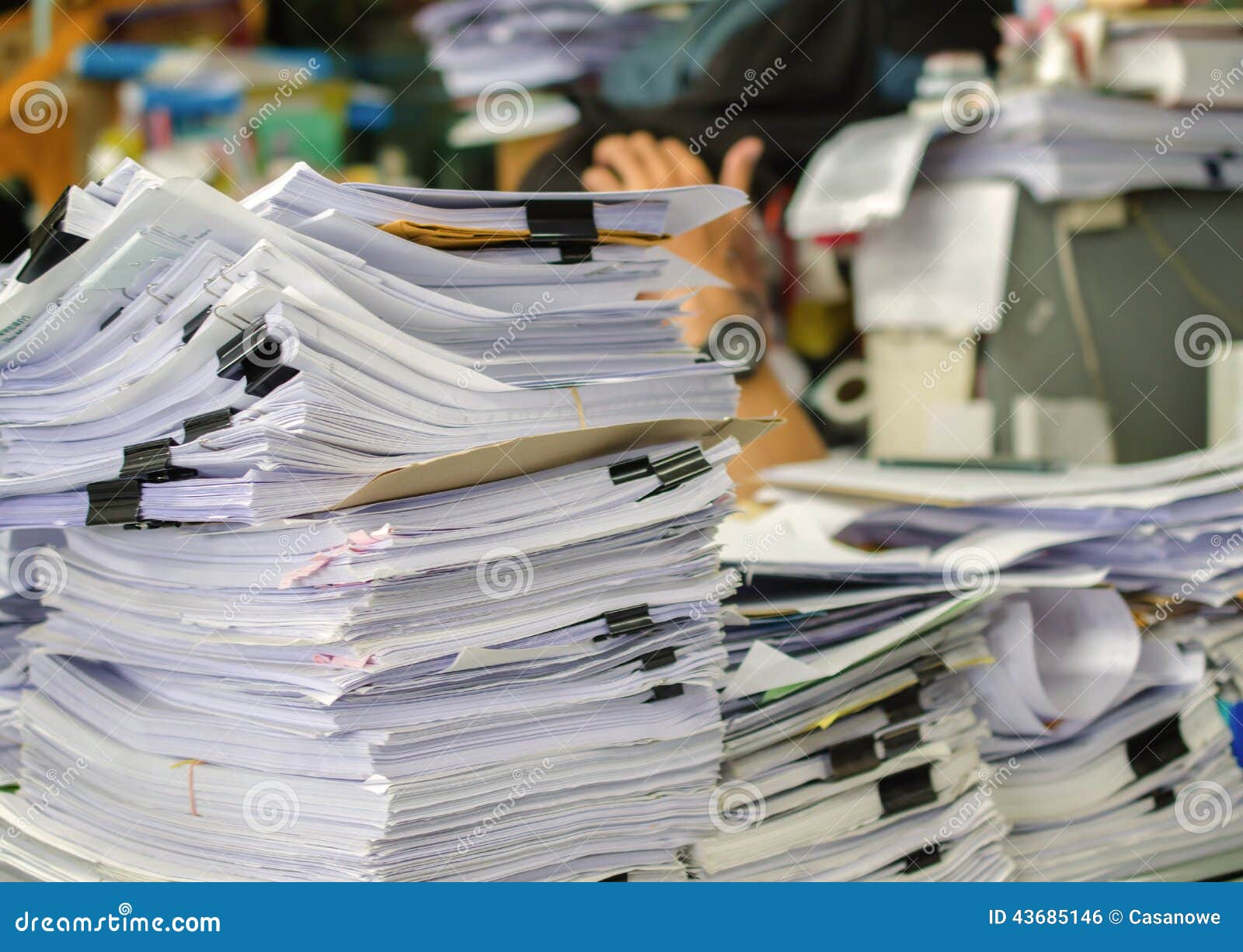 Pile of Documents on Desk Stack Up High Waiting To Be Managed Stock ...