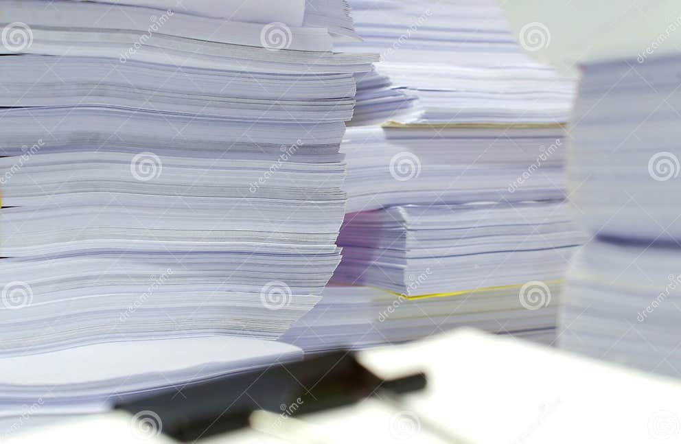 Pile of Documents on Desk Stack Up High Waiting To Be Managed Stock ...