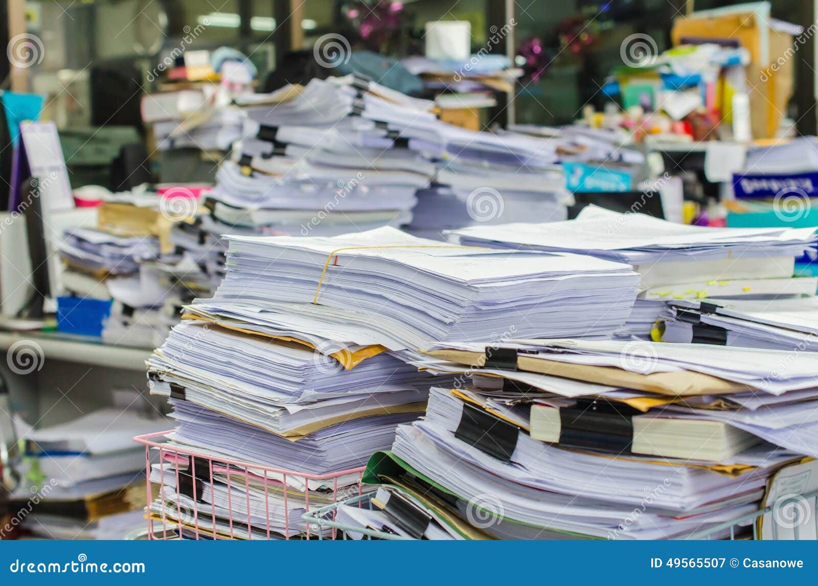 Pile of Documents on Desk Stack Up High Waiting To Be Managed Stock ...