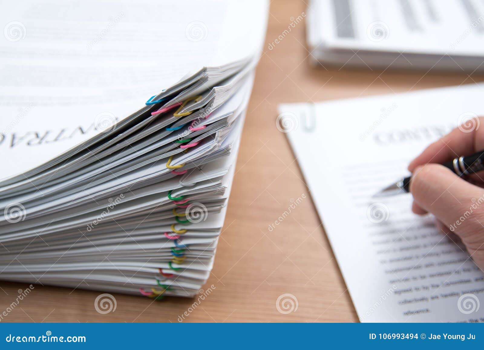 A Pile of Documents with the Man Stock Photo - Image of office ...
