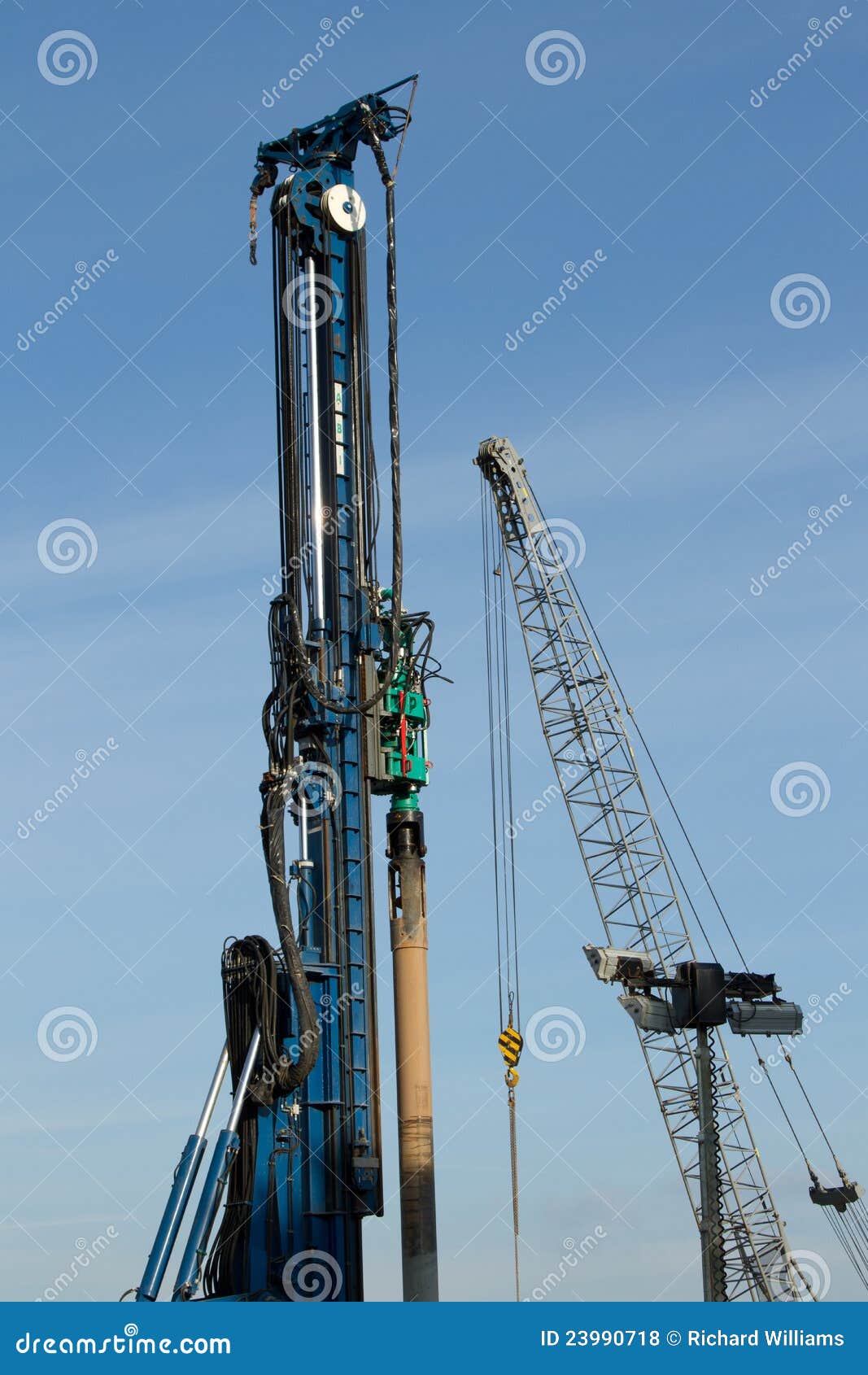 Pile driver and crane. stock photo. Image of hoses, driver - 23990718