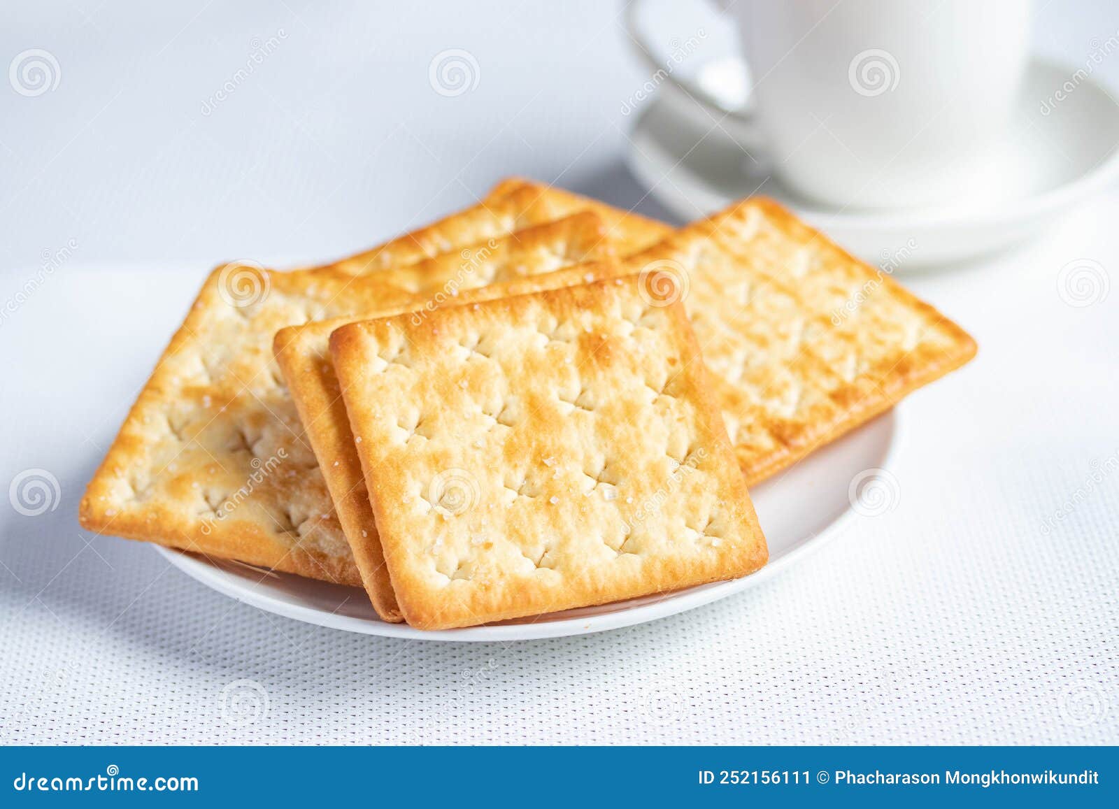 A Pile of Dry, Thin Crackers in a Cup. Natural Light Stock Image ...
