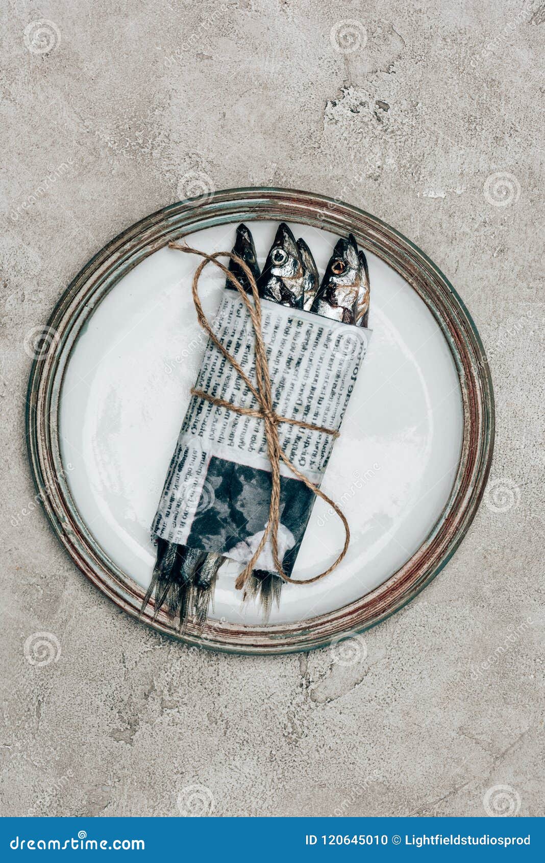 Pile of Fish in Newspaper Wrapped by String Stock Photo - Image of ...