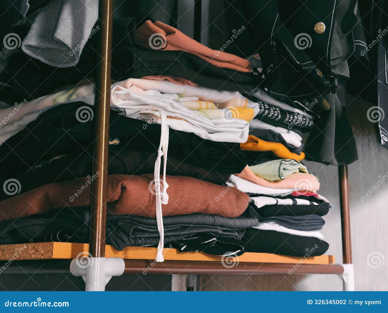 A Pile of Folded and Rubbed Clothes Stock Photo - Image of aesthetic ...