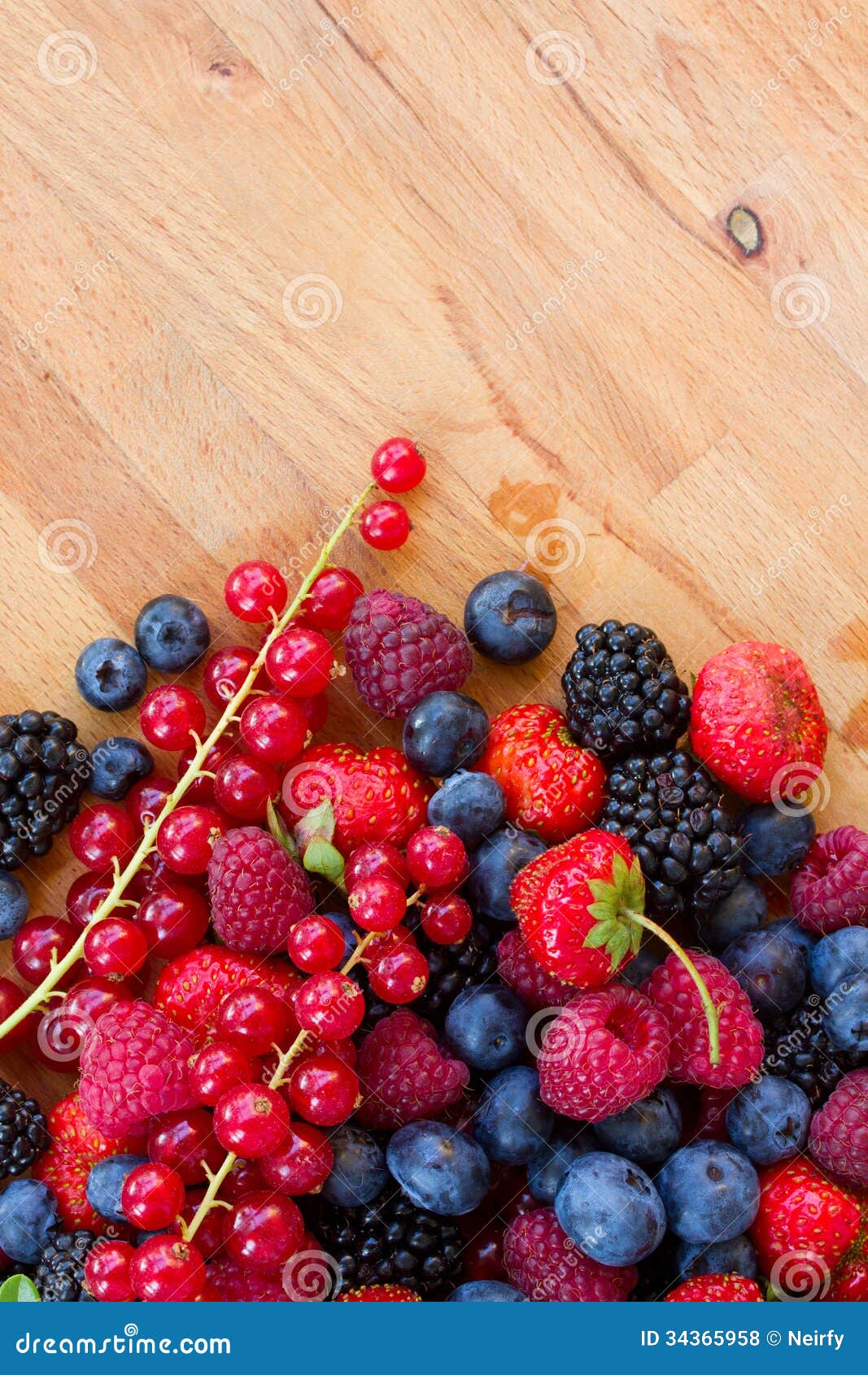 Pile of Fresh Red and Blue Berries on Table Stock Photo - Image of ...
