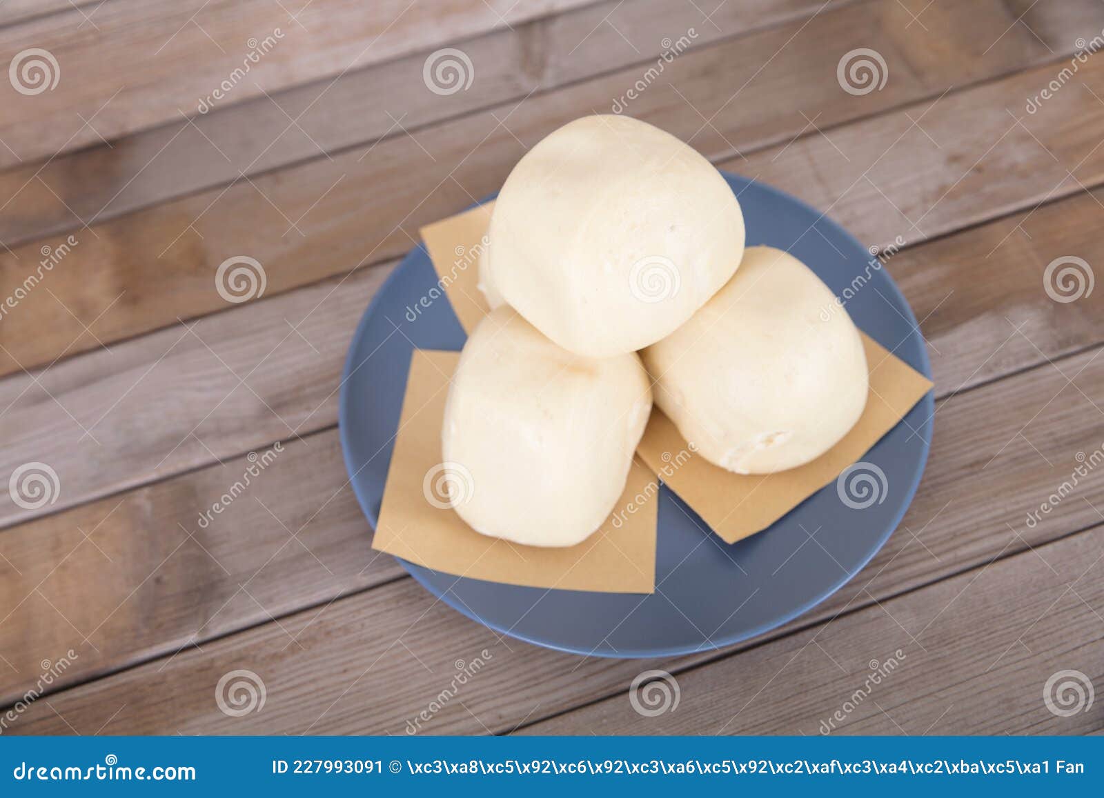 A Pile of Freshly Made Big White Steamed Buns on a Plate Stock Image ...