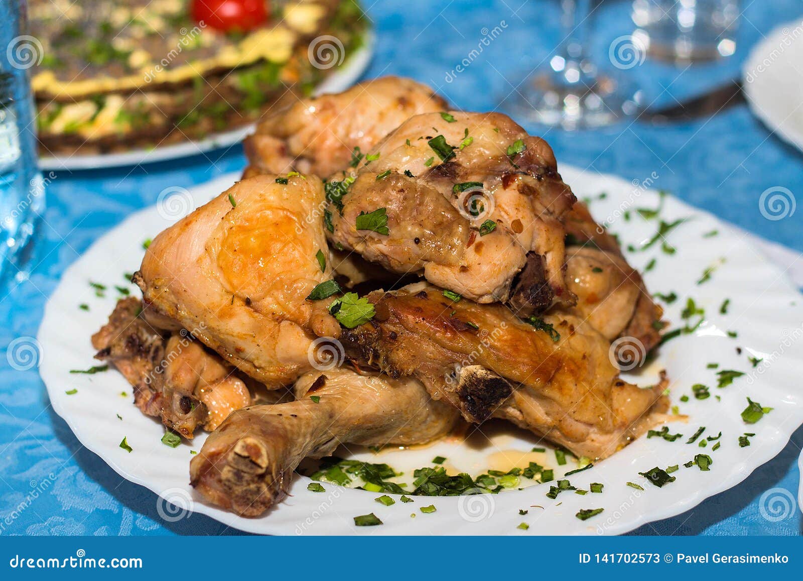 A Pile of Fried Chicken on a White Plate on the Restaurant Table Stock ...