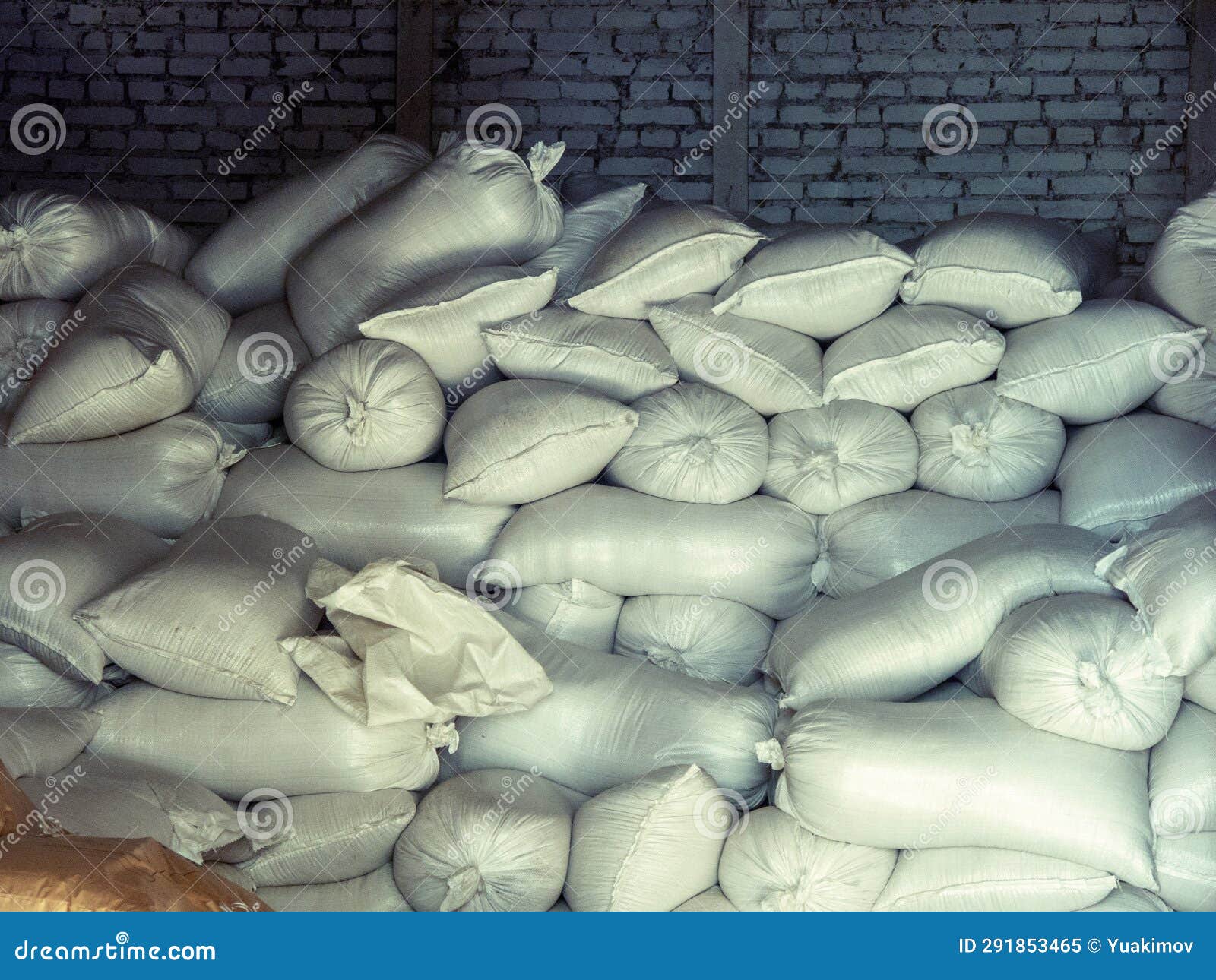 Pile of Full White Bags with White Brick Wall Stock Image - Image of ...