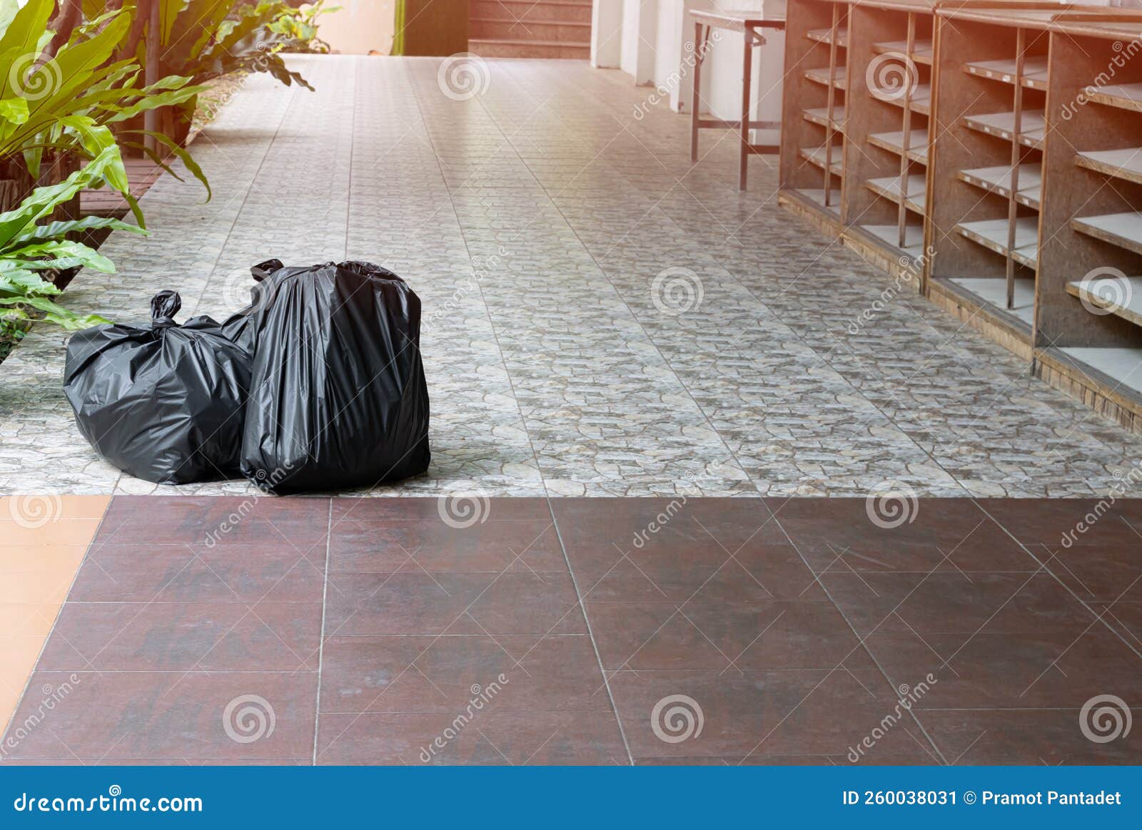 Pile of Garbage Black Bag on Sidewalk Inside Office Building Stock ...