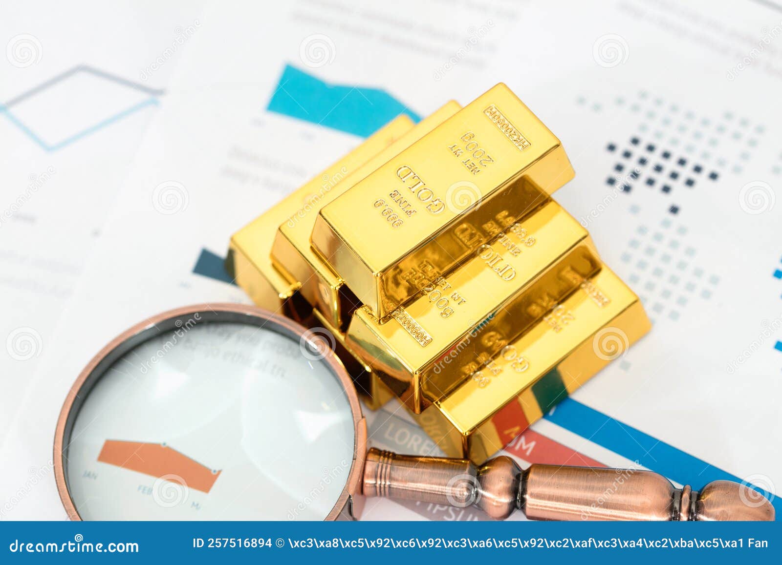 A Pile of Gold and a Magnifying Glass on the Document Stock Photo ...