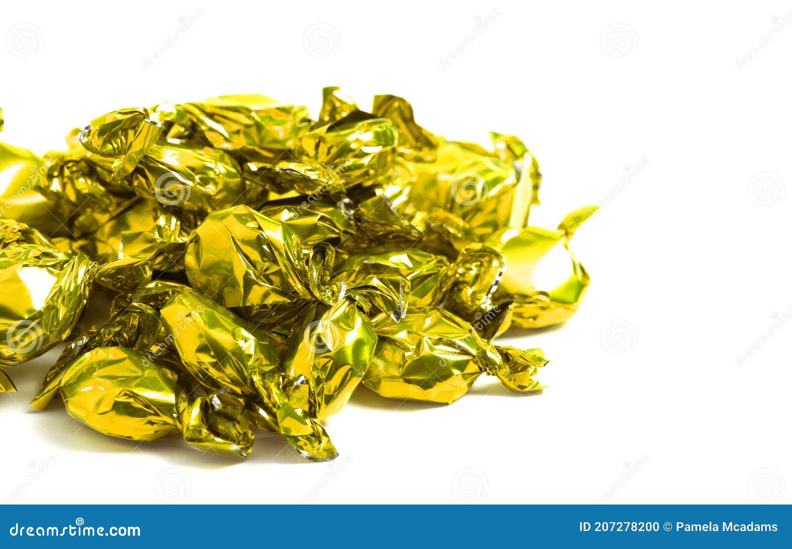 Pile of Golden Wrapped Candy Isolated on a White Background Stock Photo ...