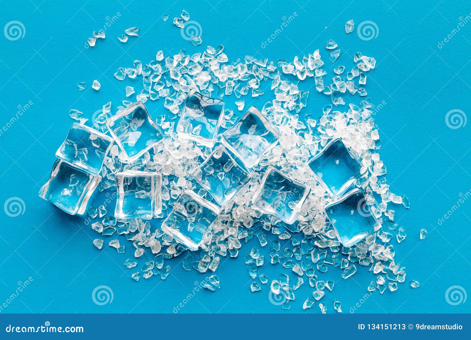 Pile of Ice Cubes on Blue Bar Table Top View Stock Image - Image of ...