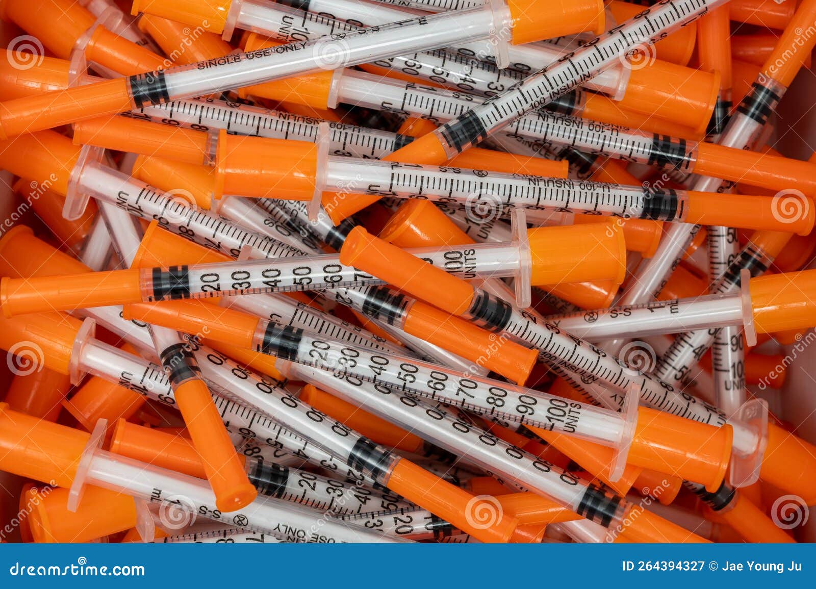 Pile of Insulin Needles with Orange Caps Stock Image - Image of needles ...
