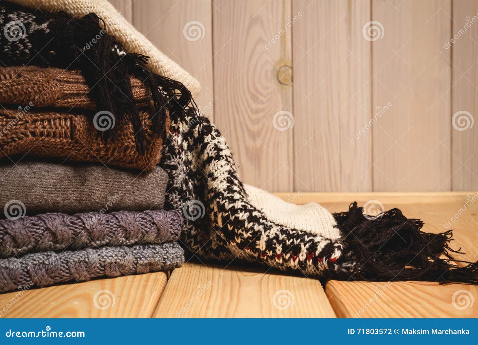 Pile of knitted sweaters stock photo. Image of details - 71803572