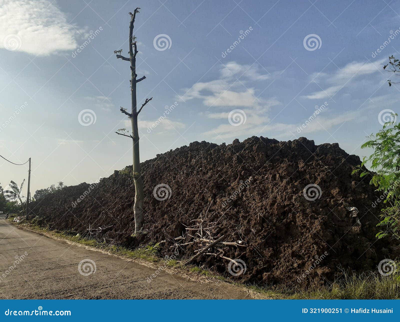 Pile of Land Next To the Road Stock Image - Image of next, pile: 321900251