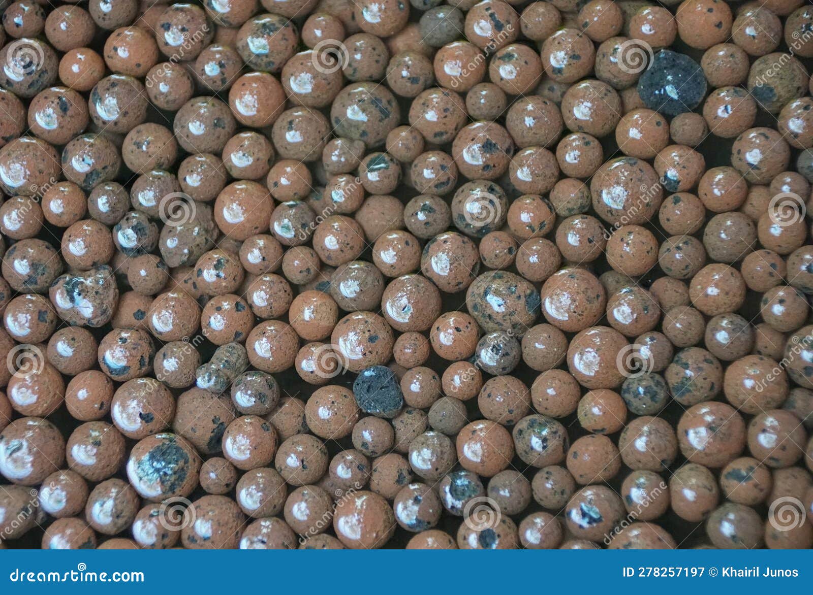 A Pile of Lightweight Expanded Clay Aggregate Floating on Water, Also ...