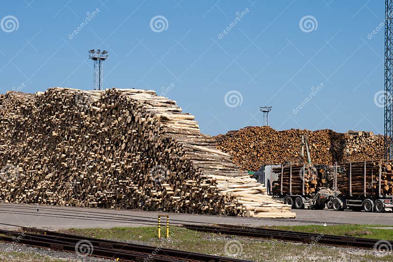 A Pile of Logs at the Port Ready for Loading Ships Stock Photo - Image ...