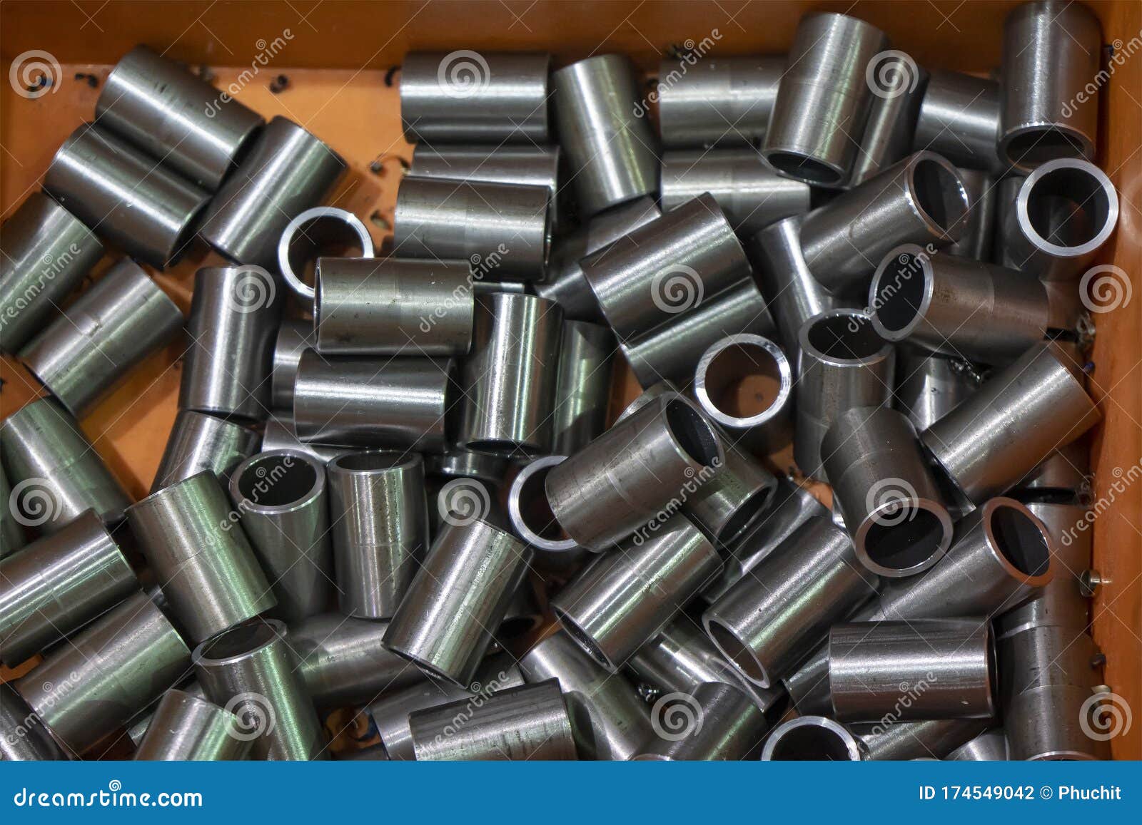 The Pile of Machined Tubes after Turning Process in the Container Box ...