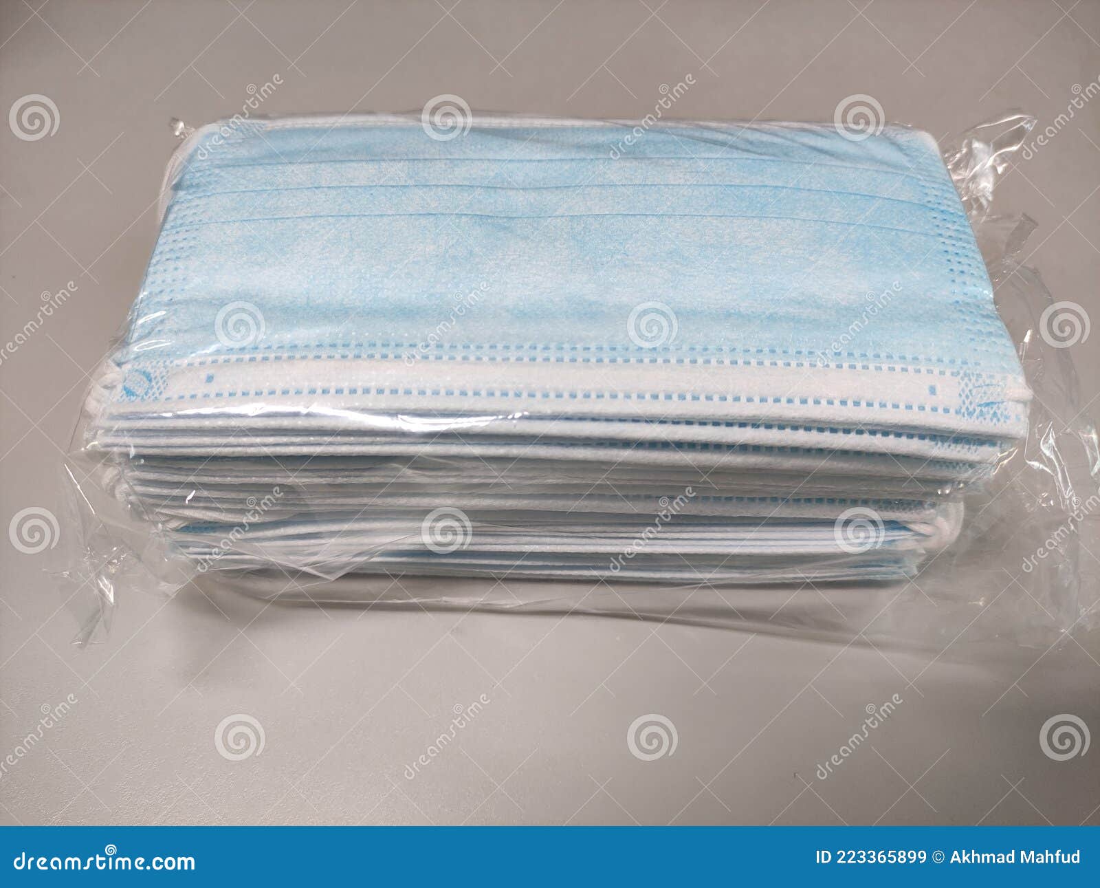 Pile of Masks Wrapped in Plastic Stock Image - Image of flooring ...