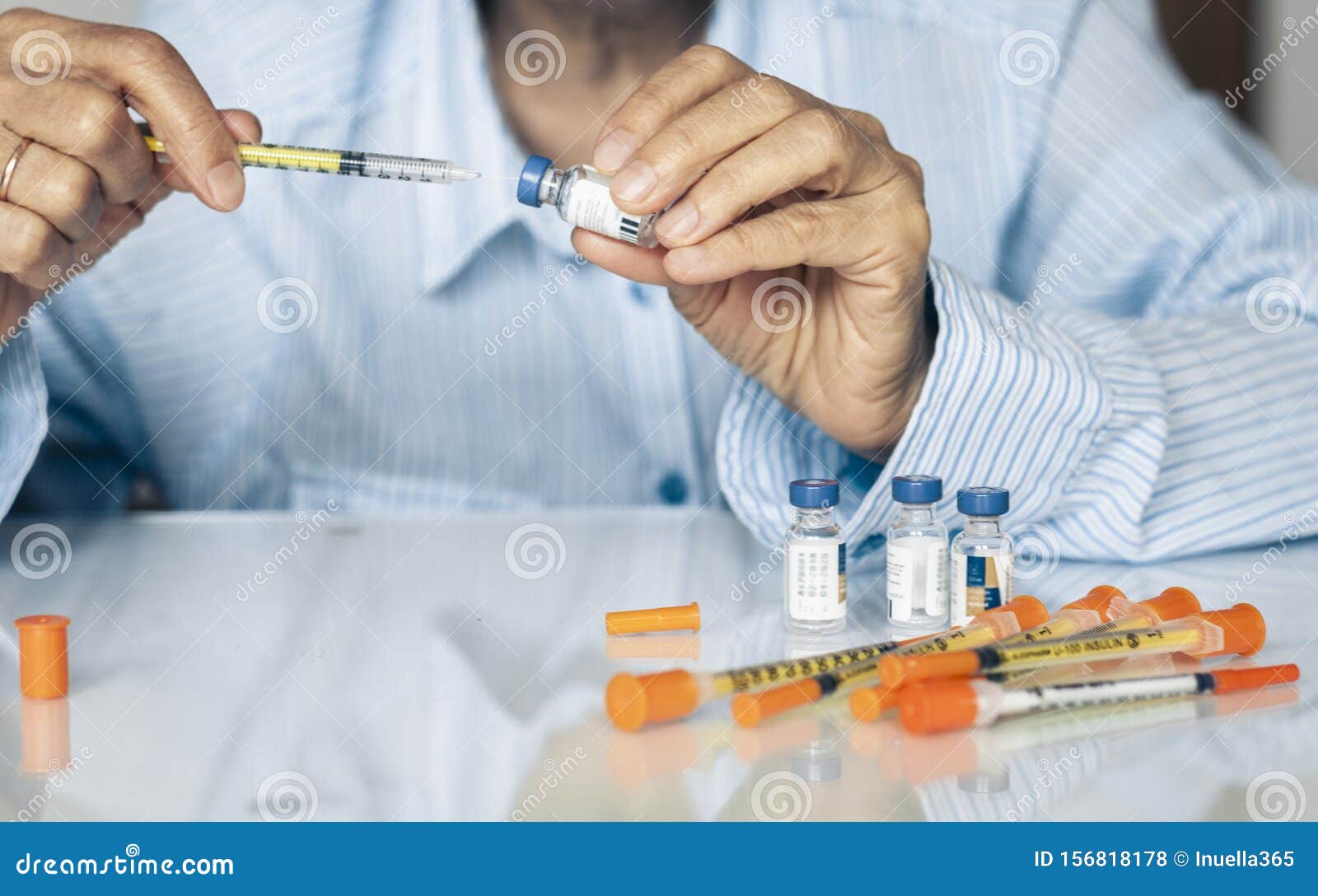 Pile of Medical Syringes and Bottle of Insulin for Diabetes in Woman ... Pile of Medical Syringes and Bottle of Insulin for Diabetes in Woman ...