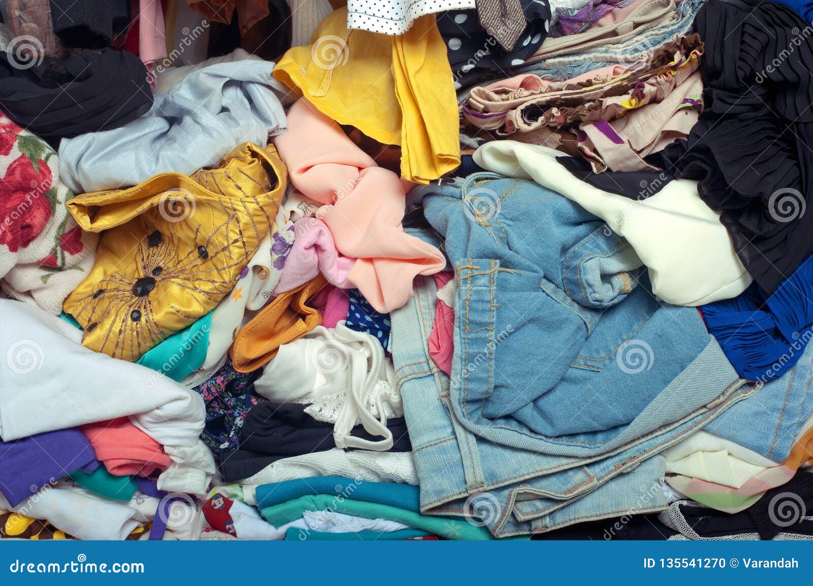 Pile of Messy Clothes in Closet. Untidy Cluttered Woman Stock Photo ... Pile of Messy Clothes in Closet. Untidy Cluttered Woman Stock Photo ...