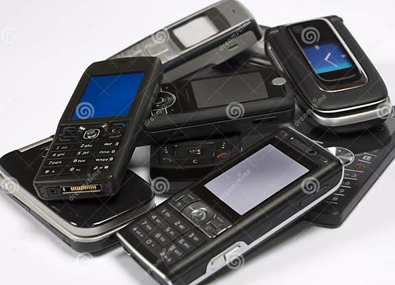 Pile of Mobile Phones stock image. Image of telephone - 2464277