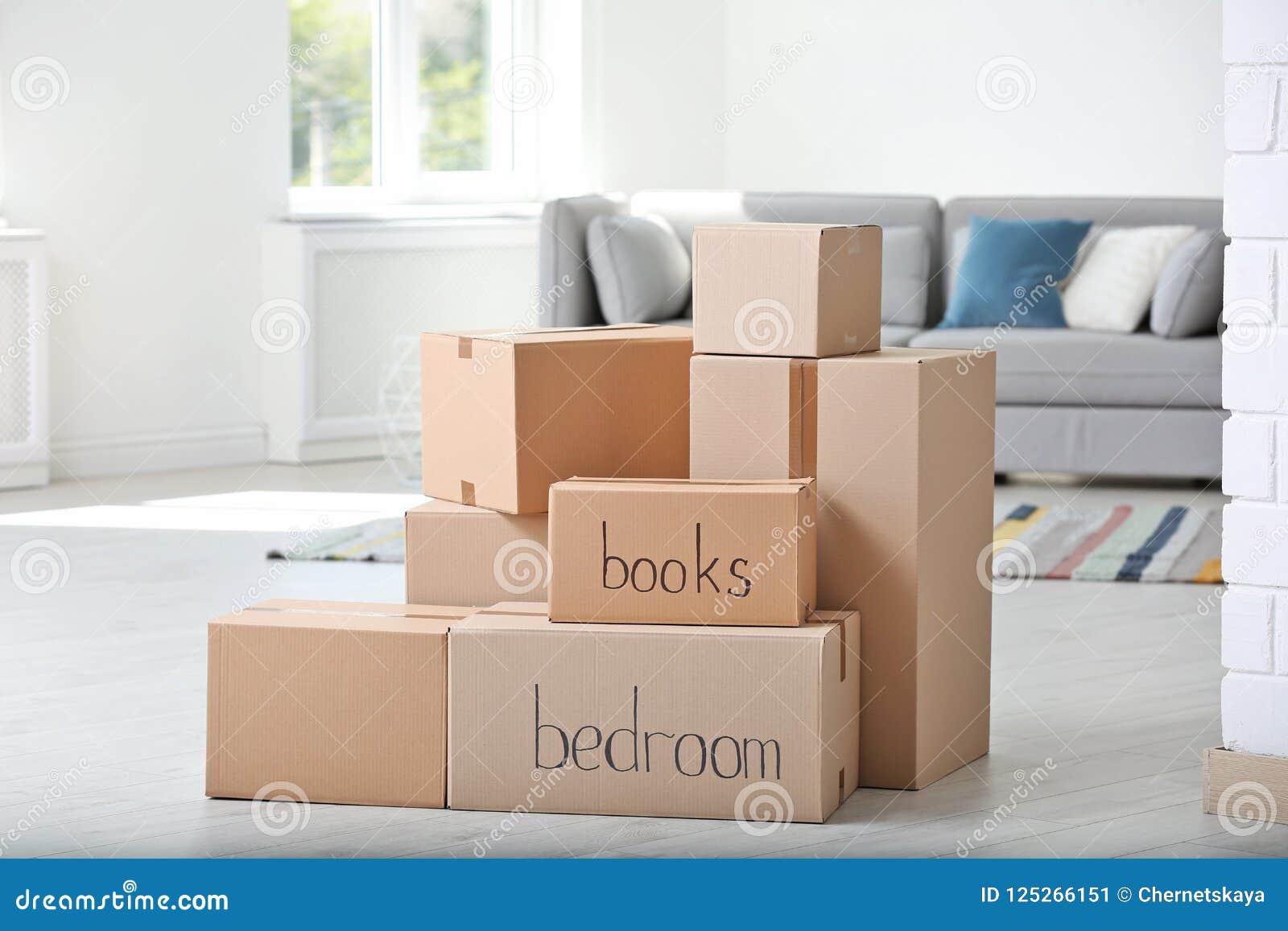 Pile of moving boxes stock image. Image of bedroom, couch - 125266151