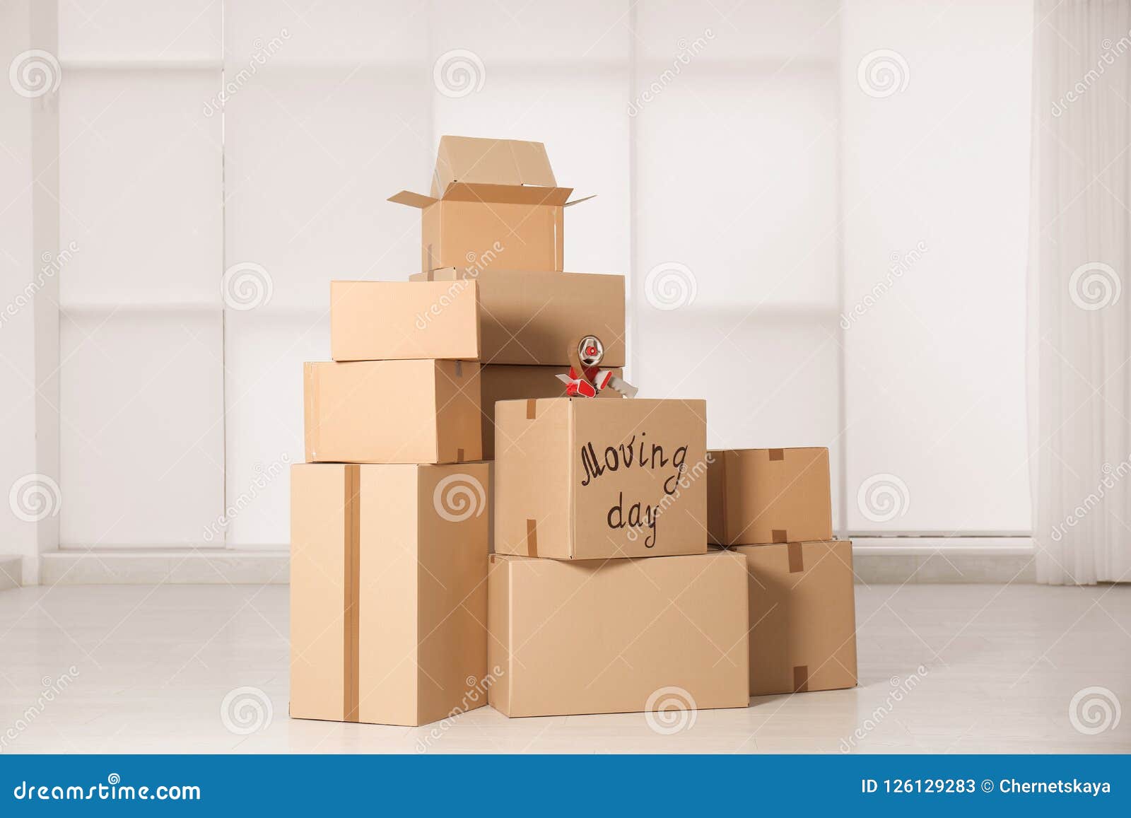Pile of Moving Boxes in Room Stock Image - Image of boxes, postal ...