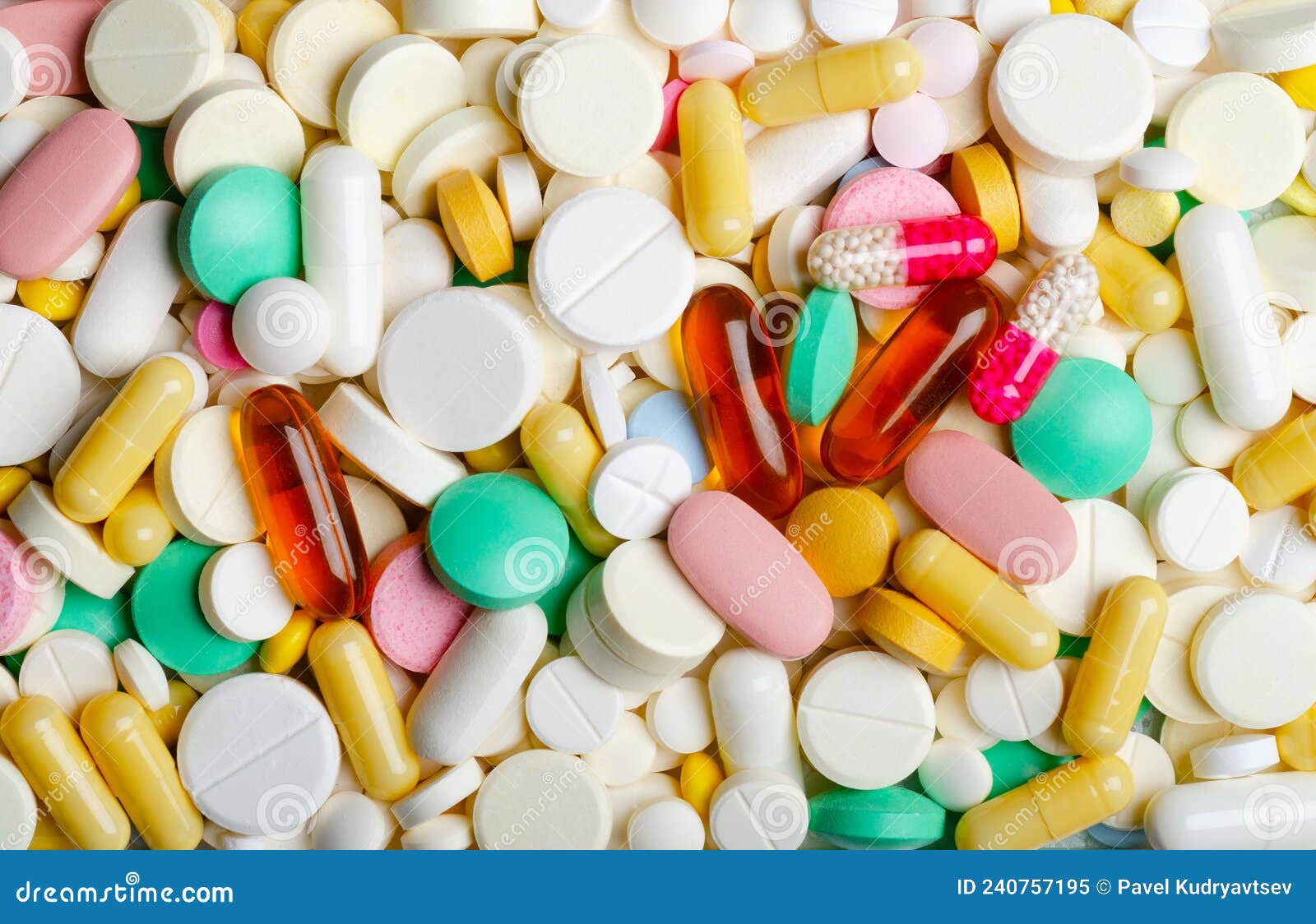 Pile of Multi-colored Tablets and Capsules. Variable Medical Concept ...