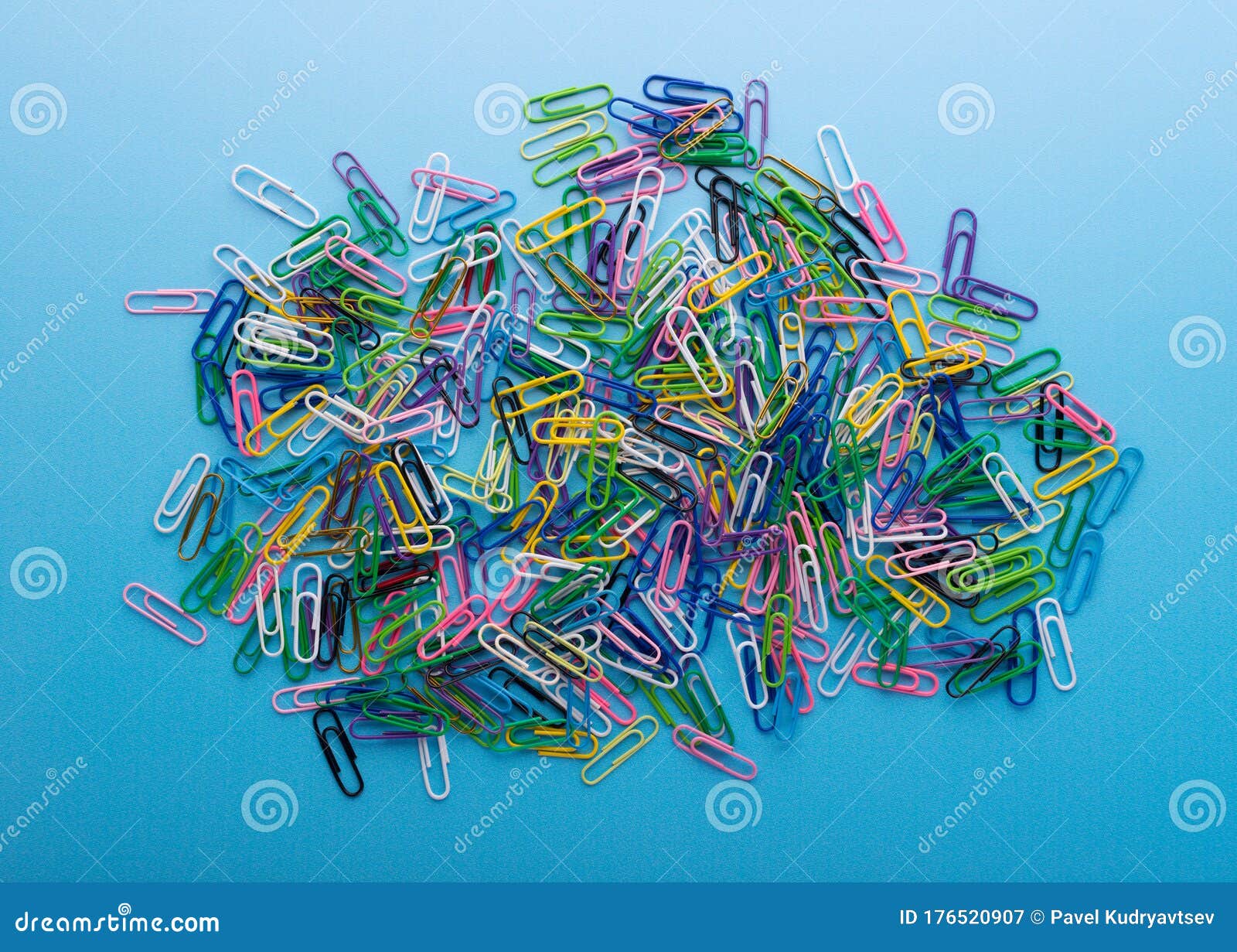 Pile of Multi Coloured Paperclips on Blue Background Stock Image ...