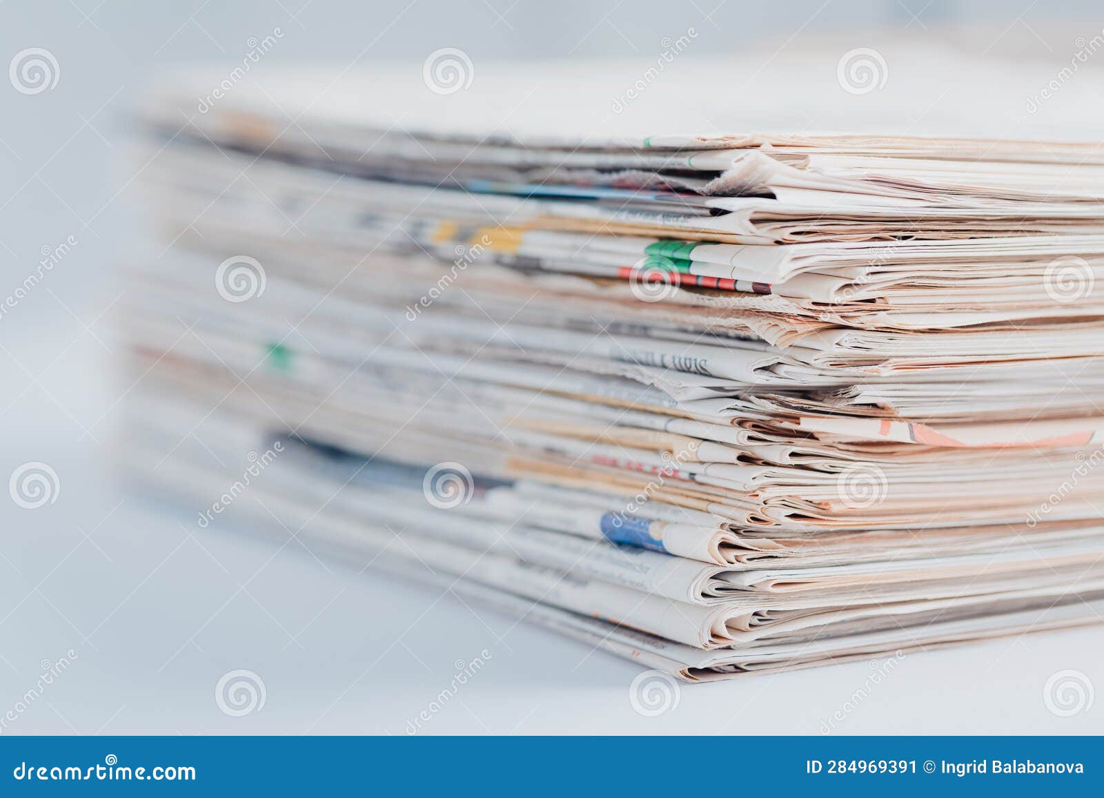 Pile of Newspapers on Table. Folded and Stacked Journals Stock Image ...