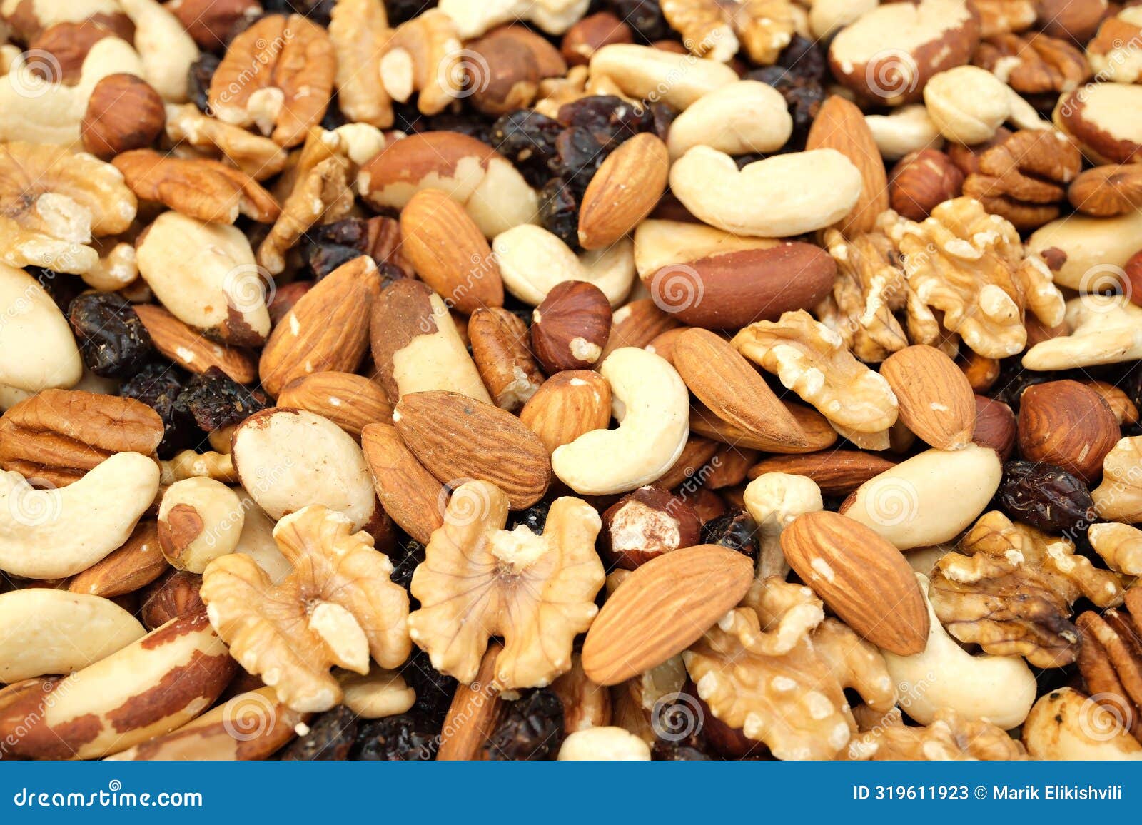 A Pile of Nuts and Legumes in Different Flavors Stock Image - Image of ...