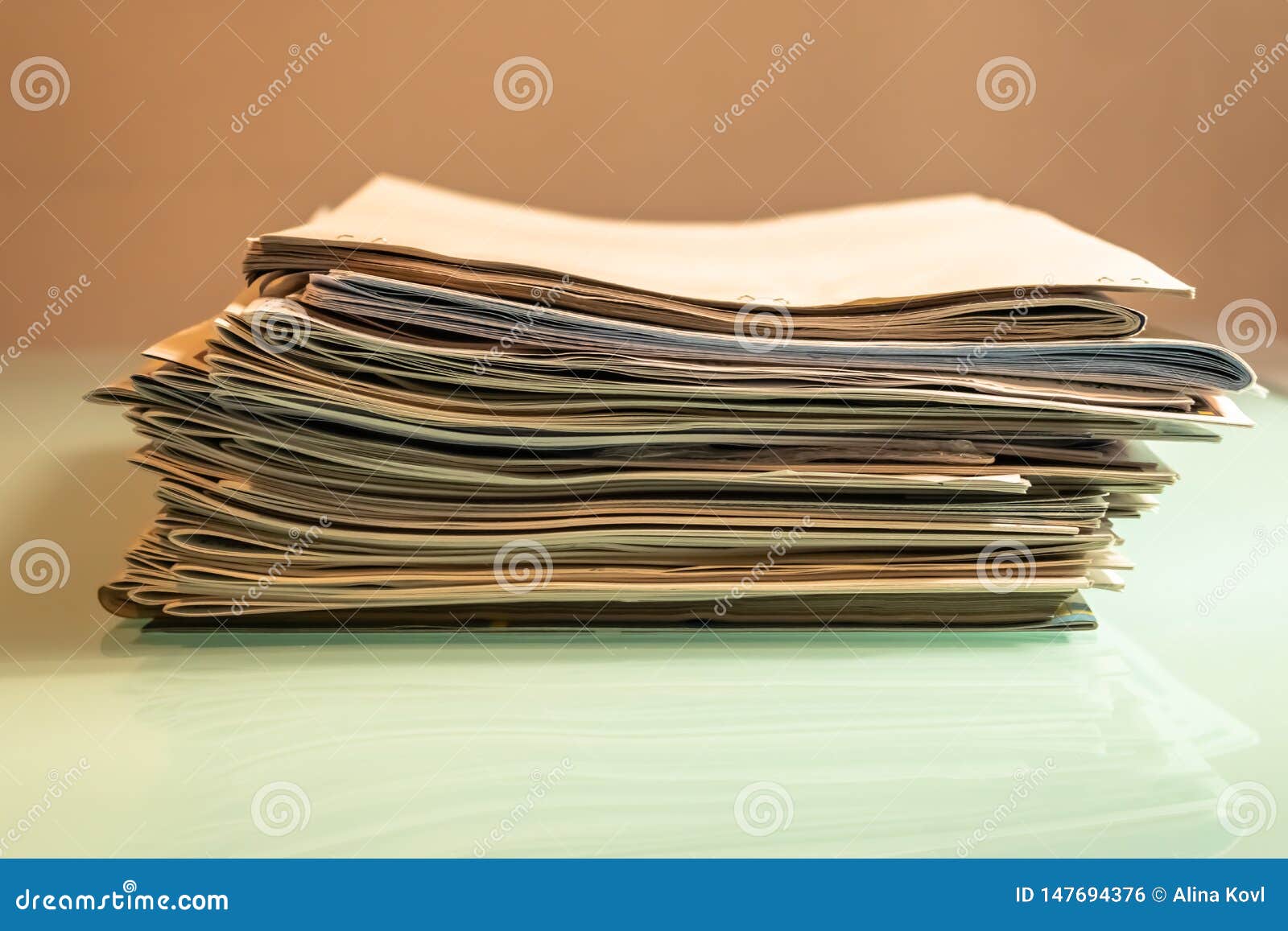 Stack Of Newspapers On Table