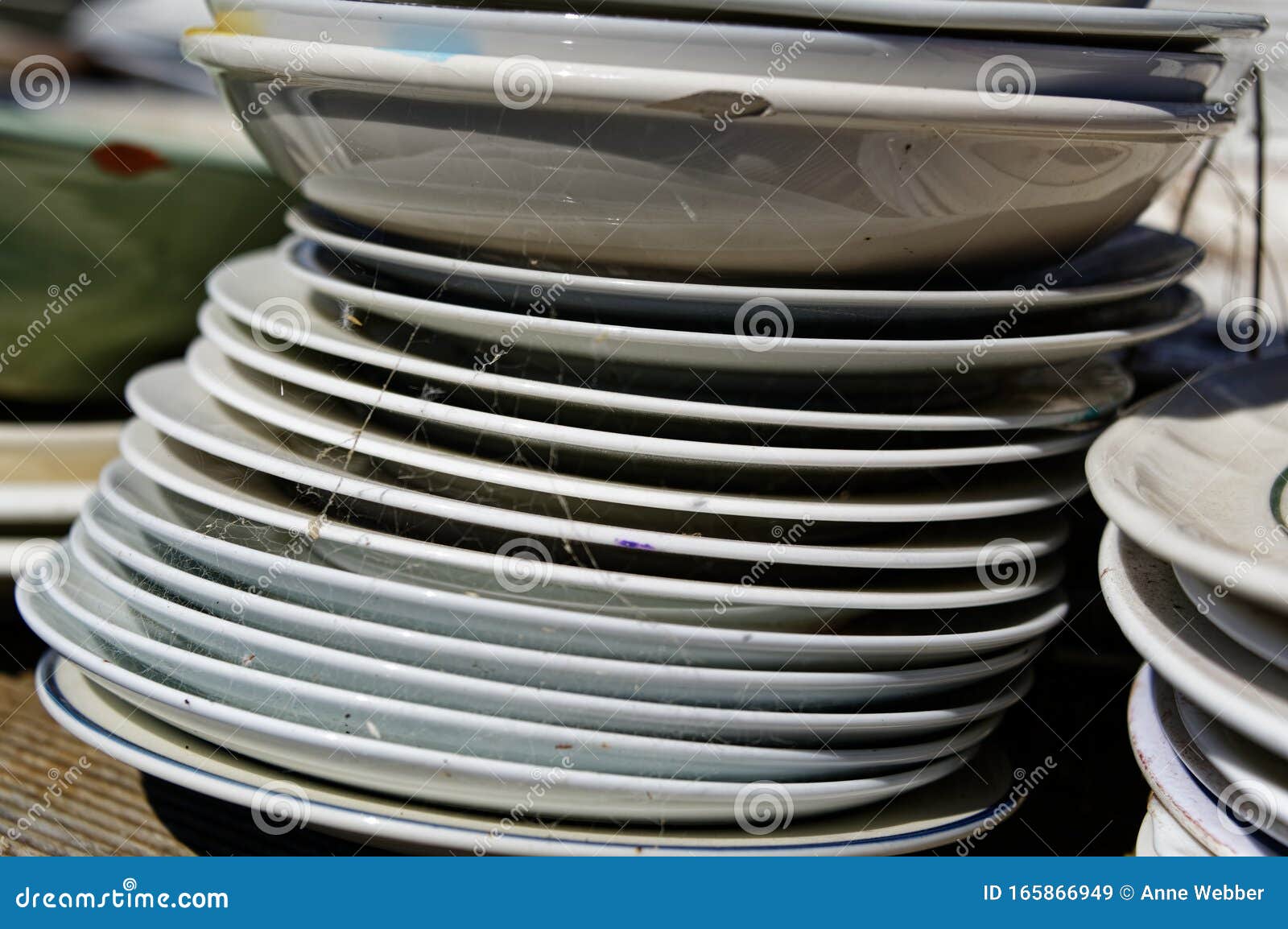 A Pile of Old Plates Sits Gathering Dust Stock Image - Image of messy ...