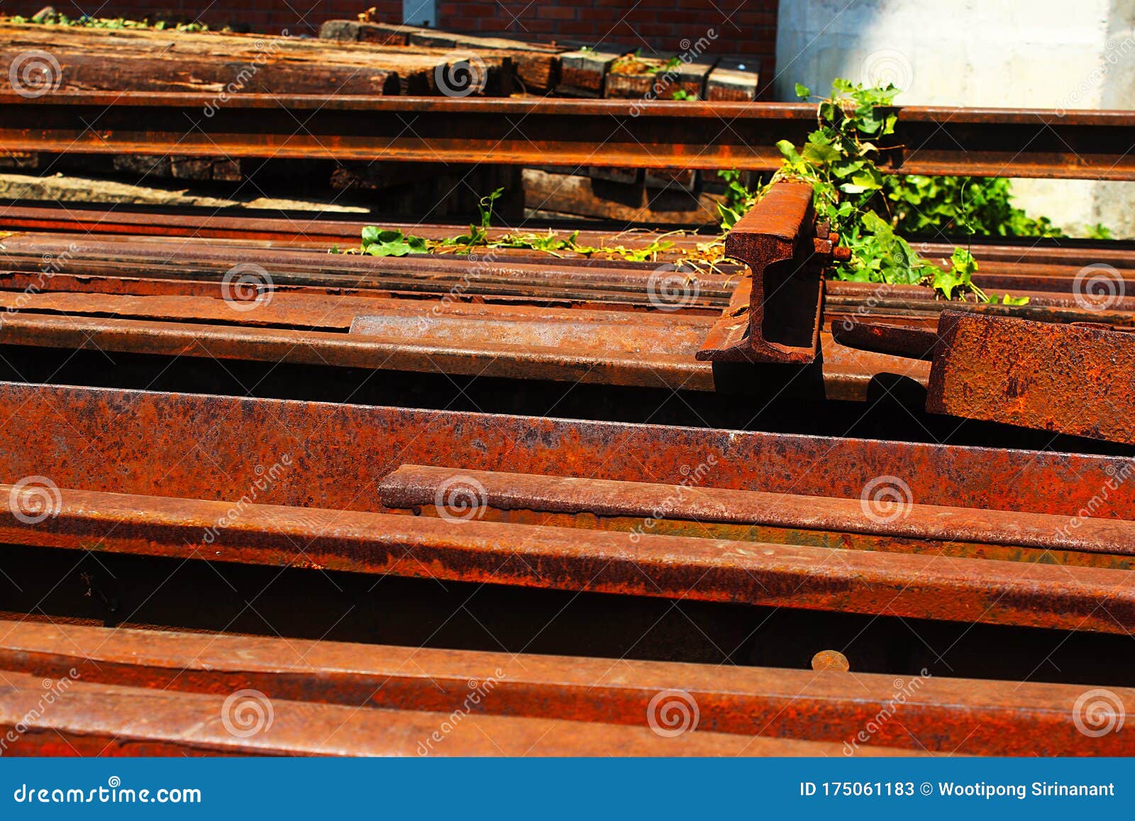 A Pile of Old Rusted Railway Tracks Stock Image - Image of rails, brown ...