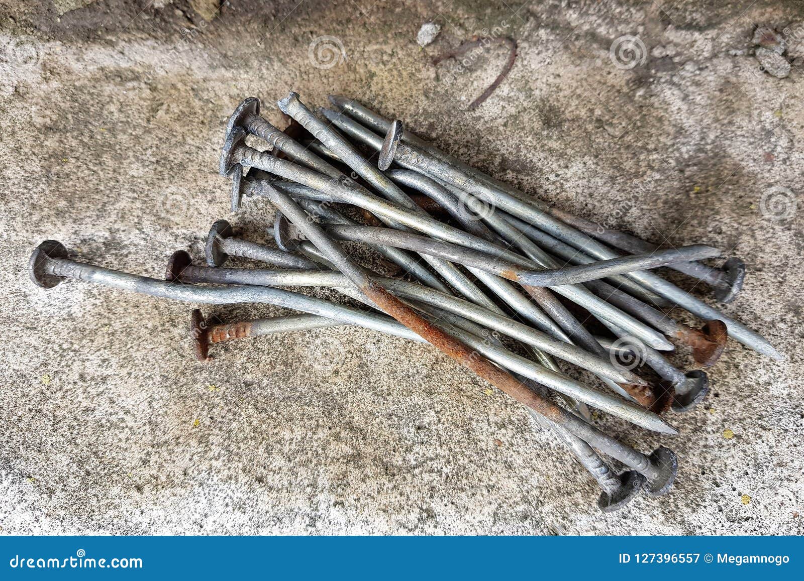Pile Old Rusty Long Nails On The Surface Of The Cement Royalty-Free ...