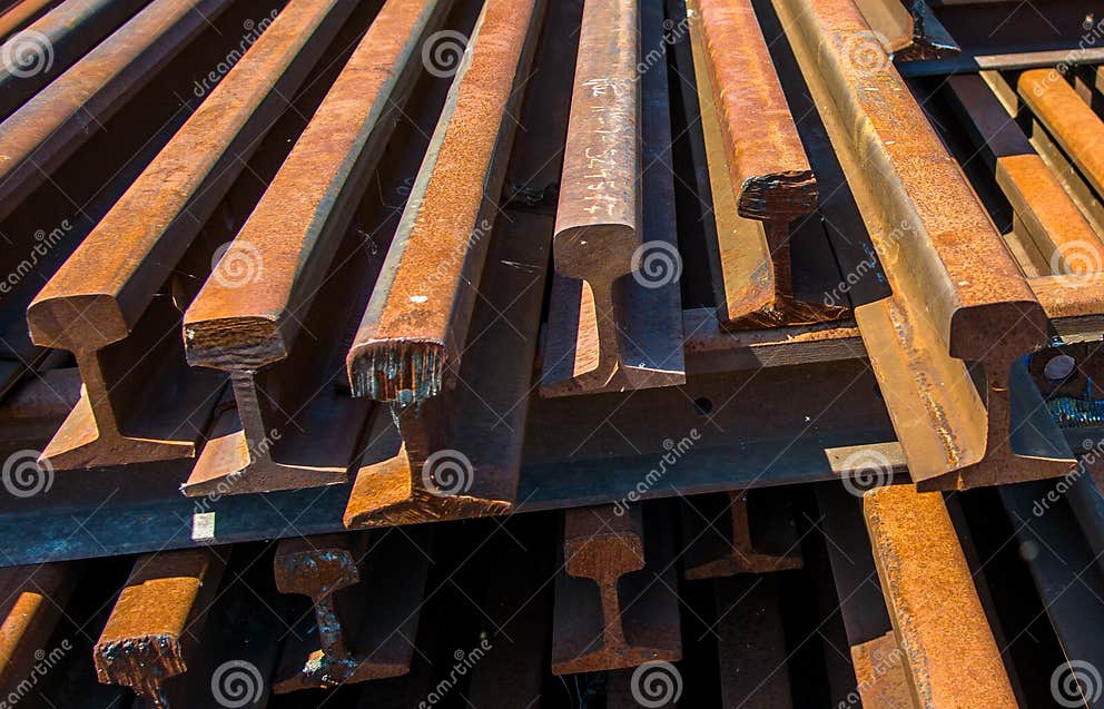 Pile of Old Rusty Rails stock photo. Image of background - 55747202