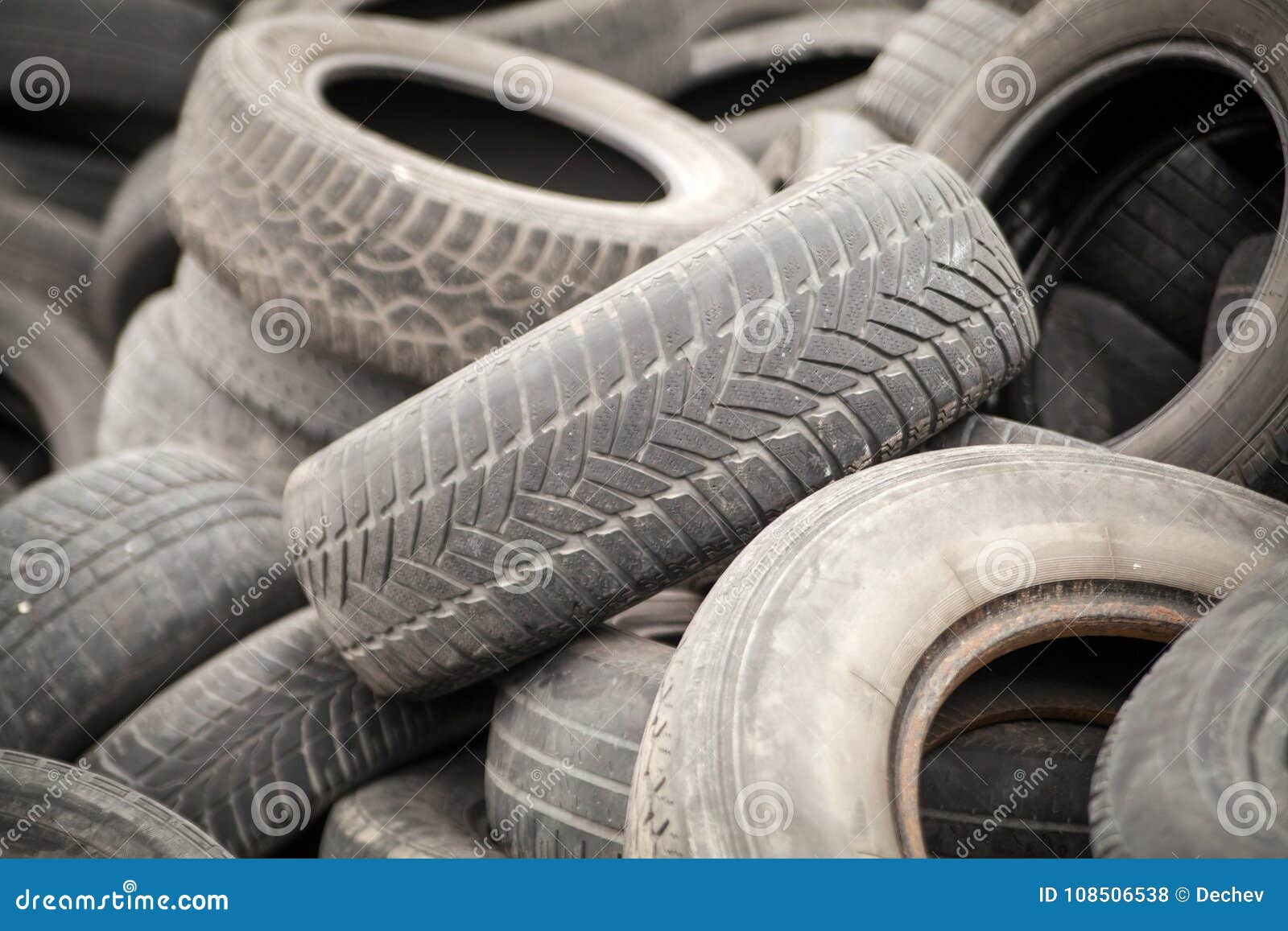 Pile of used rubber tyres stock photo. Image of scrap - 108506538