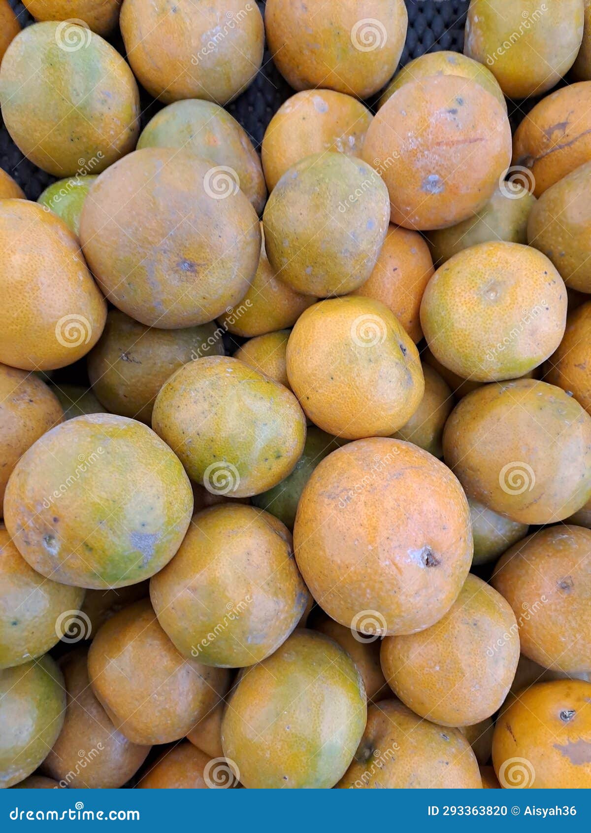 Pile of Orange Fruit on Display in a Fruit Shop Stock Photo - Image of ...