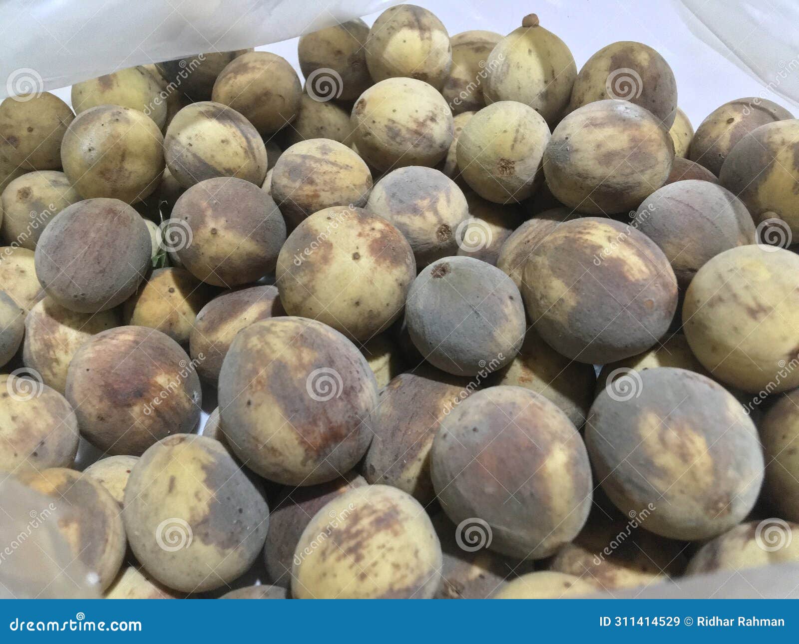 A Pile of Overripe Duku Fruit in Plastic Stock Image - Image of asia ...