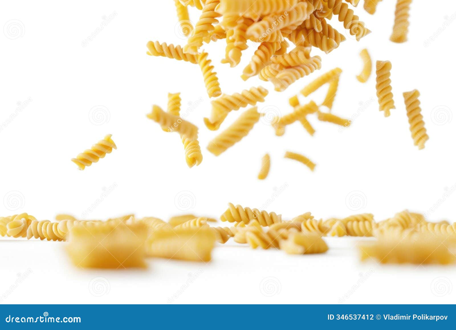 Pile of Pasta Falls Off White Surface Stock Photo - Image of culinary ...