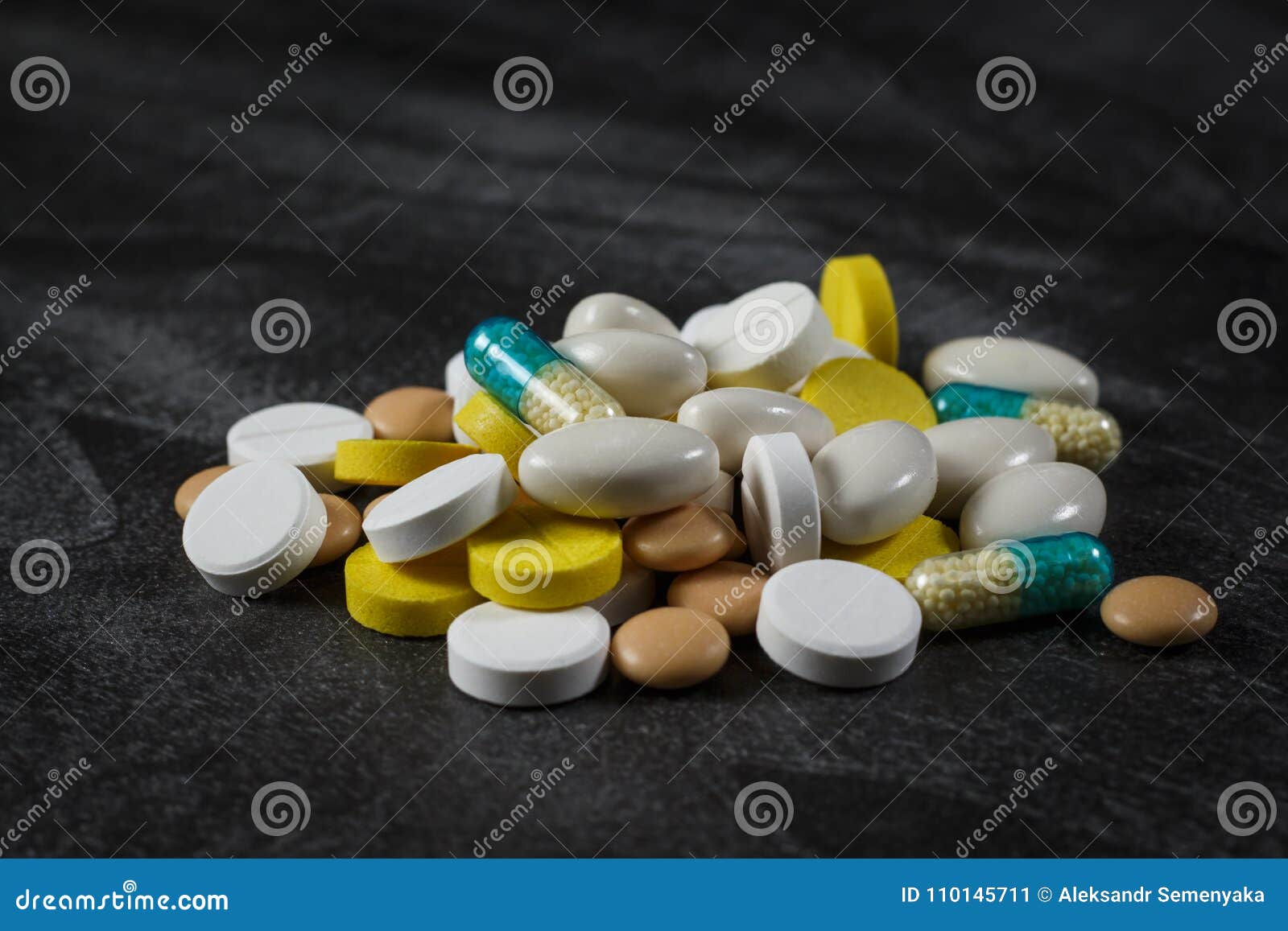 A Pile of Pills and Capsules on a Table Stock Image - Image of ...