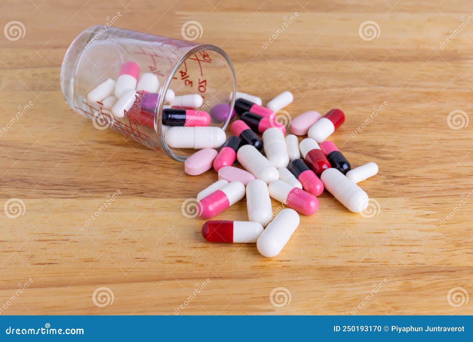 The Pile of Pills Capsules on Wood Table Stock Photo - Image of ...