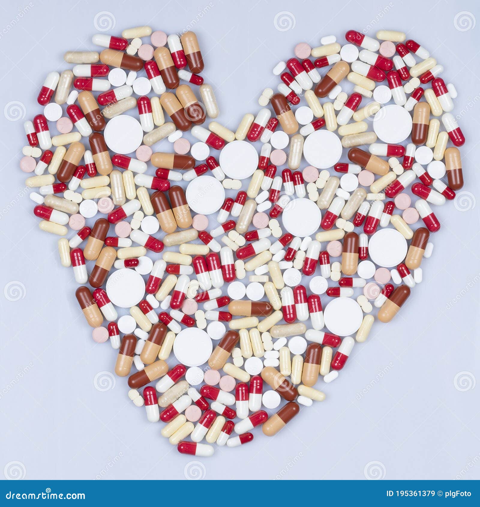 A Pile of Pills Make Up the Shape of a Heart Isolated Stock Image ...