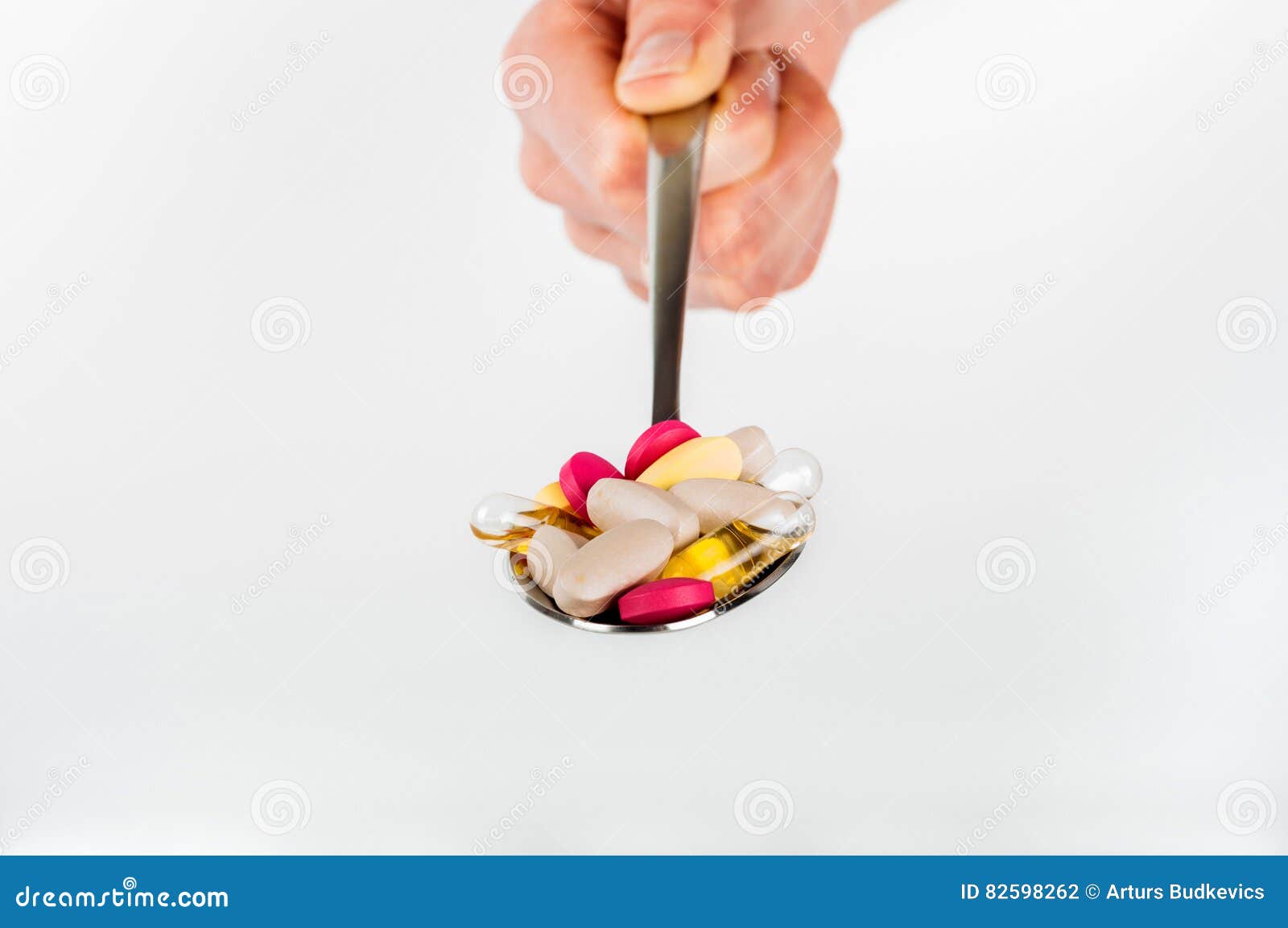 Pile of pills in spoon stock photo. Image of money, medication - 82598262